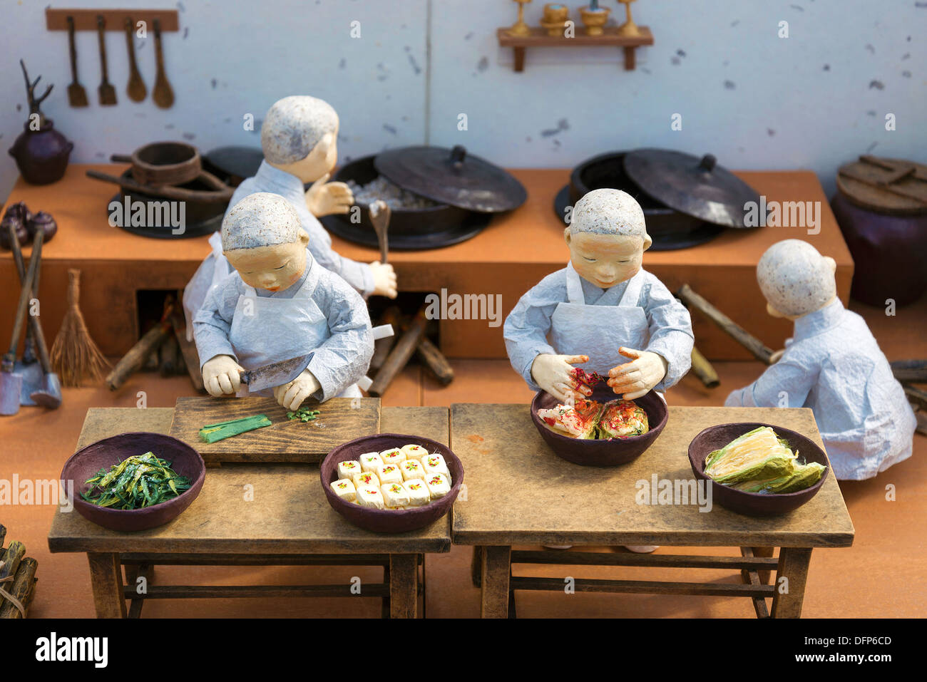 korean monk figures preparing traditional korean food Stock Photo - Alamy