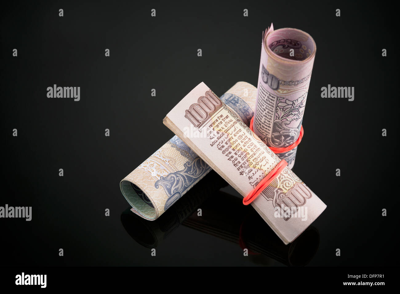 Close-up of rolled-up Indian paper currency Stock Photo - Alamy