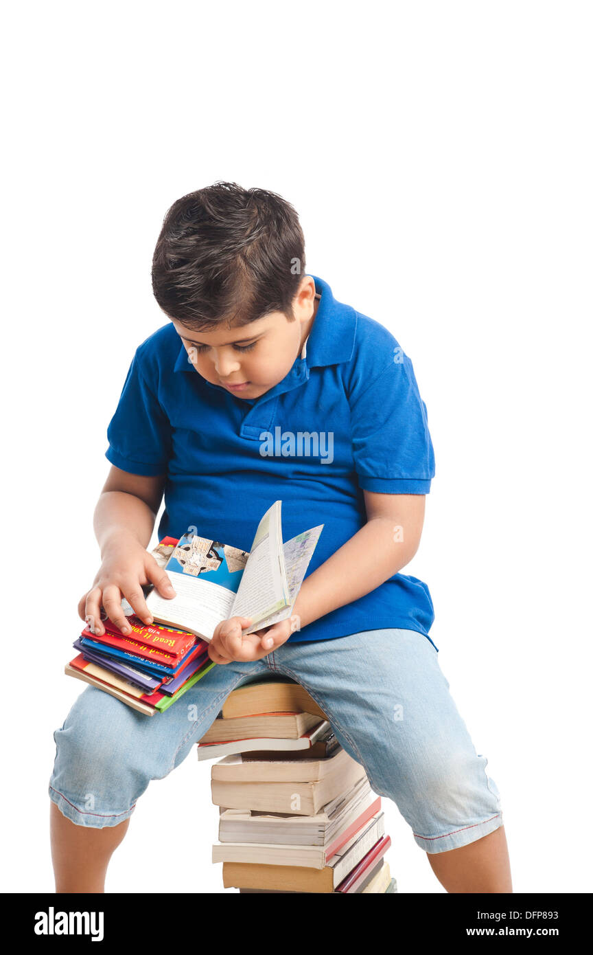 Asian boy is holding book hi-res stock photography and images - Alamy