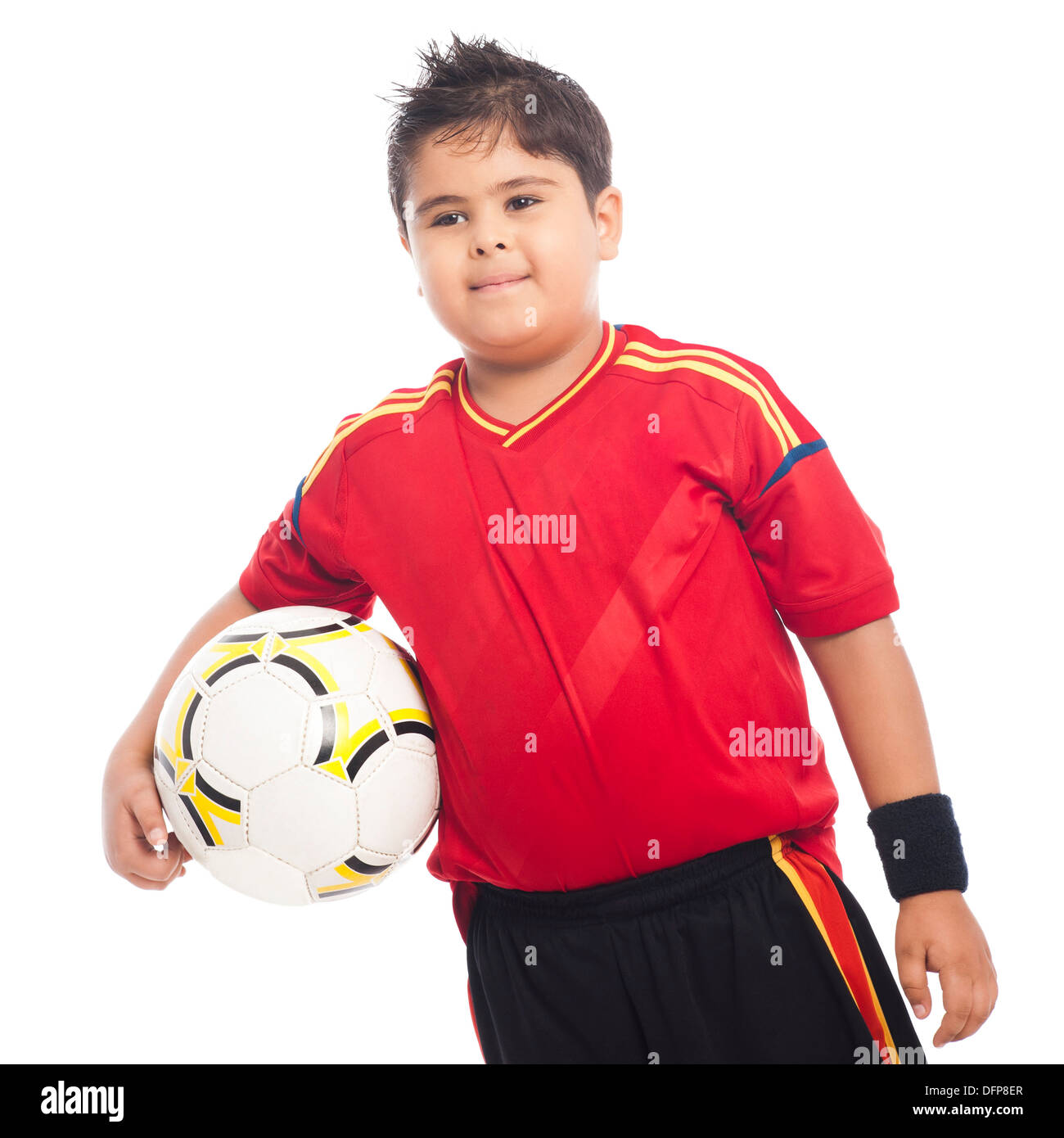 Boy carrying a soccer ball Stock Photo - Alamy