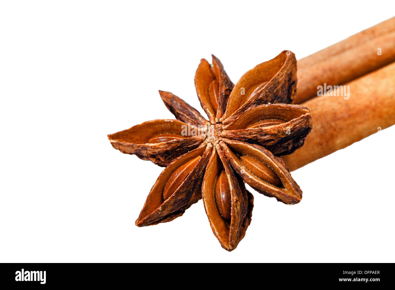 Star anise and two cinnamon sticks isolated on white background Stock ...