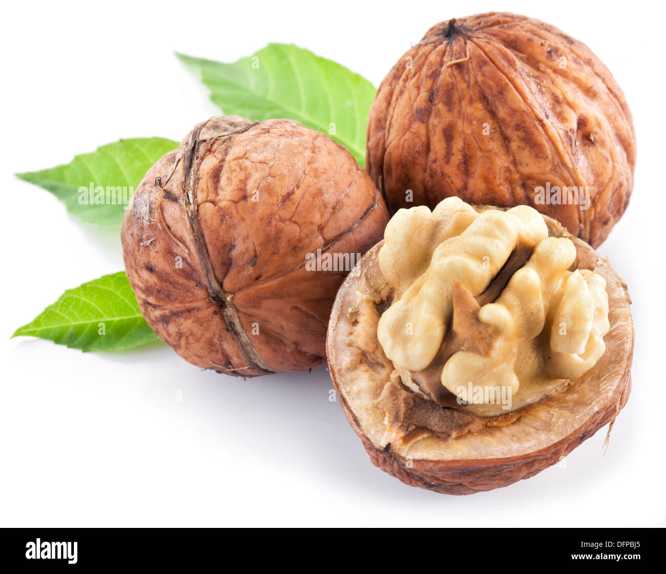 Walnuts with leaves isolated on a white background Stock Photo - Alamy