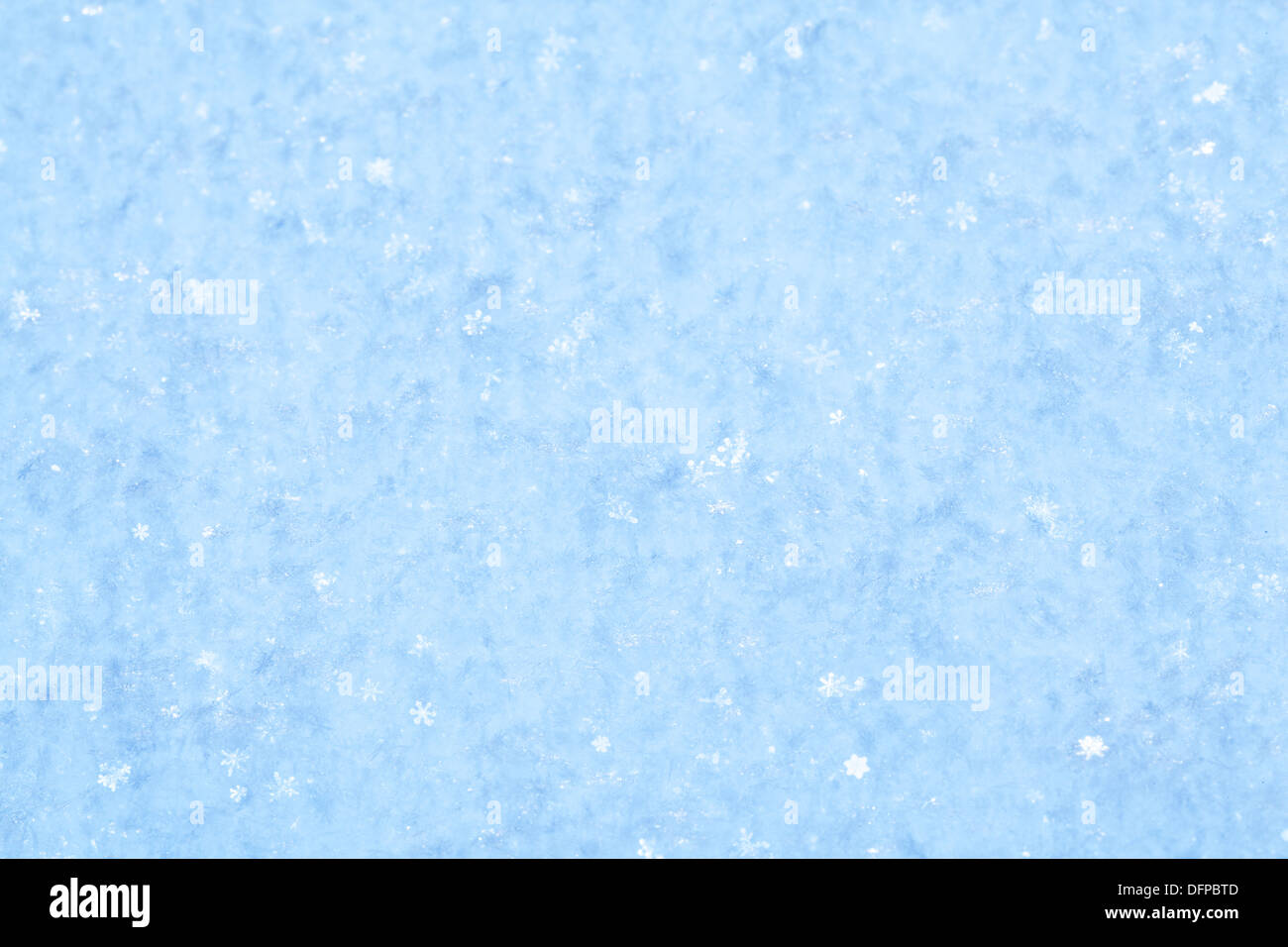 Blue sparkling snow background with white little snowflakes Stock Photo ...
