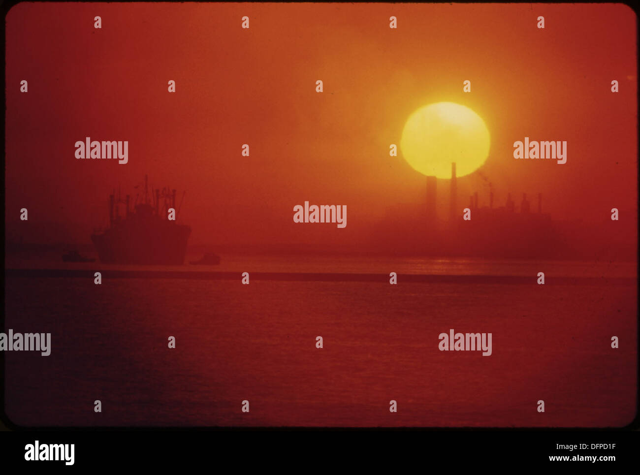 This photograph captures the sun rising over the skyline of Cleveland ...