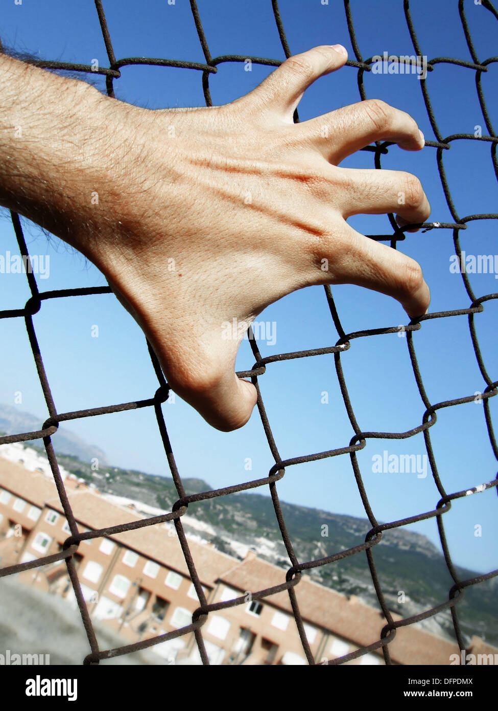 Hand fence chainlink fence hi-res stock photography and images - Alamy