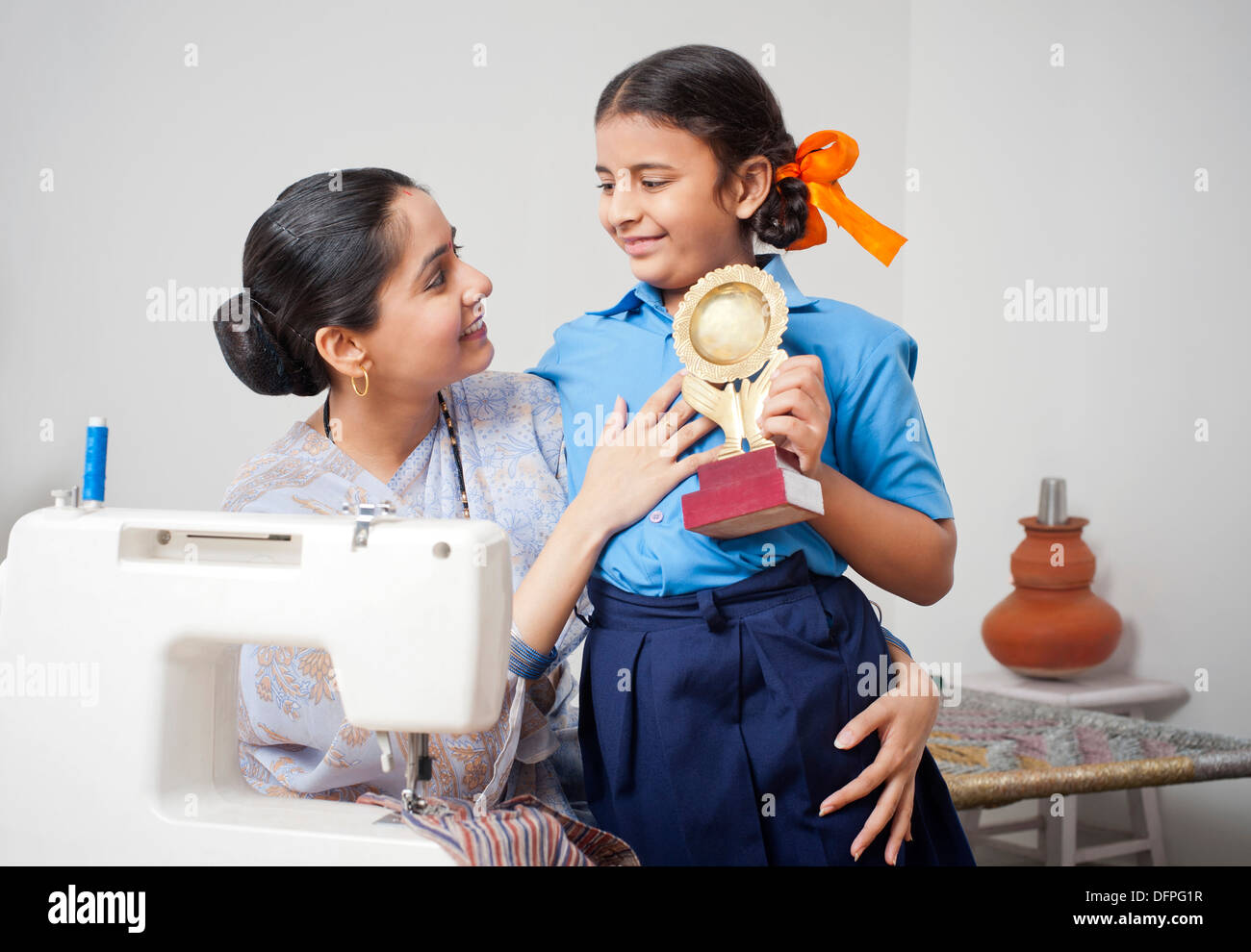 Girl winning trophy hi-res stock photography and images - Alamy