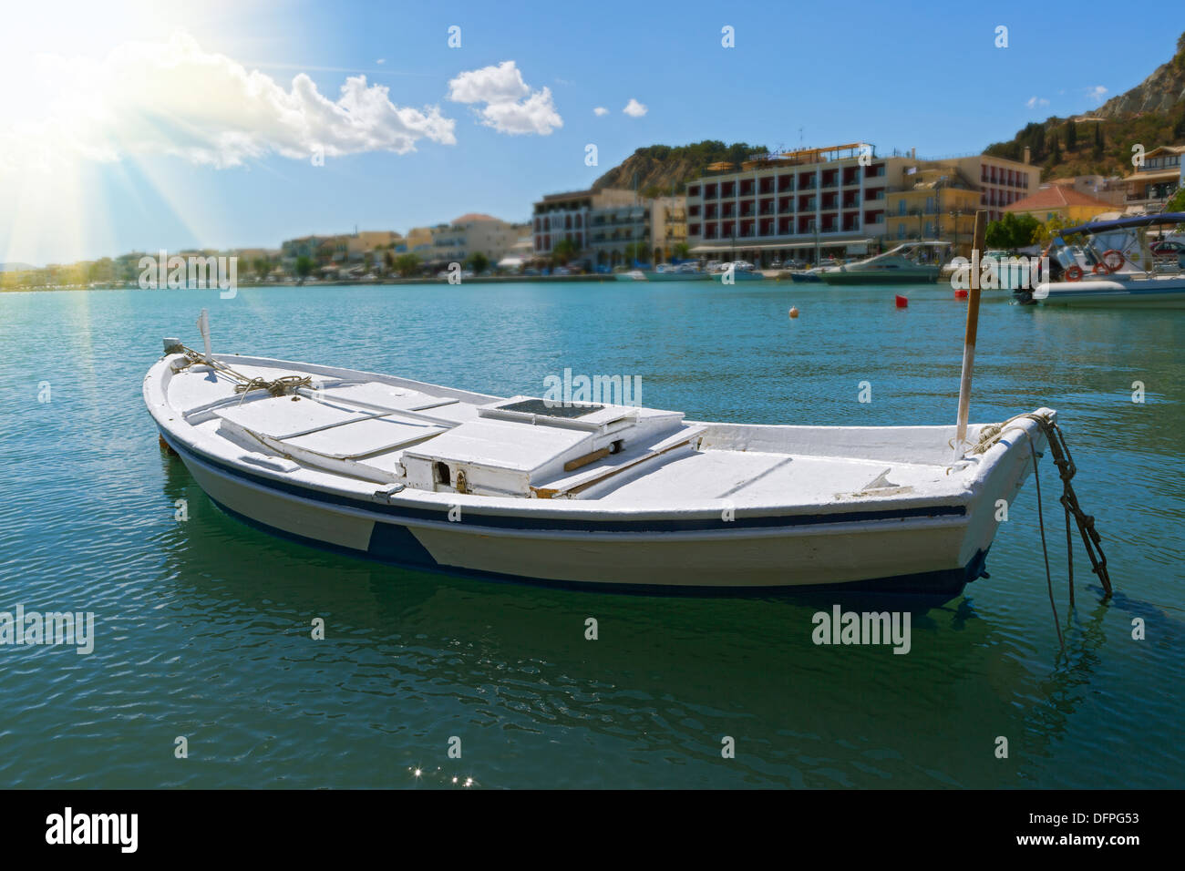 Small white rowing boat floats in Zakythos (Zante Stock Photo - Alamy