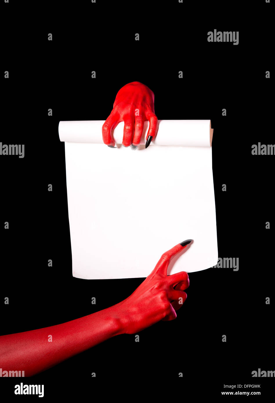 Red devil hands holding paper scroll and pointing at signature place ...