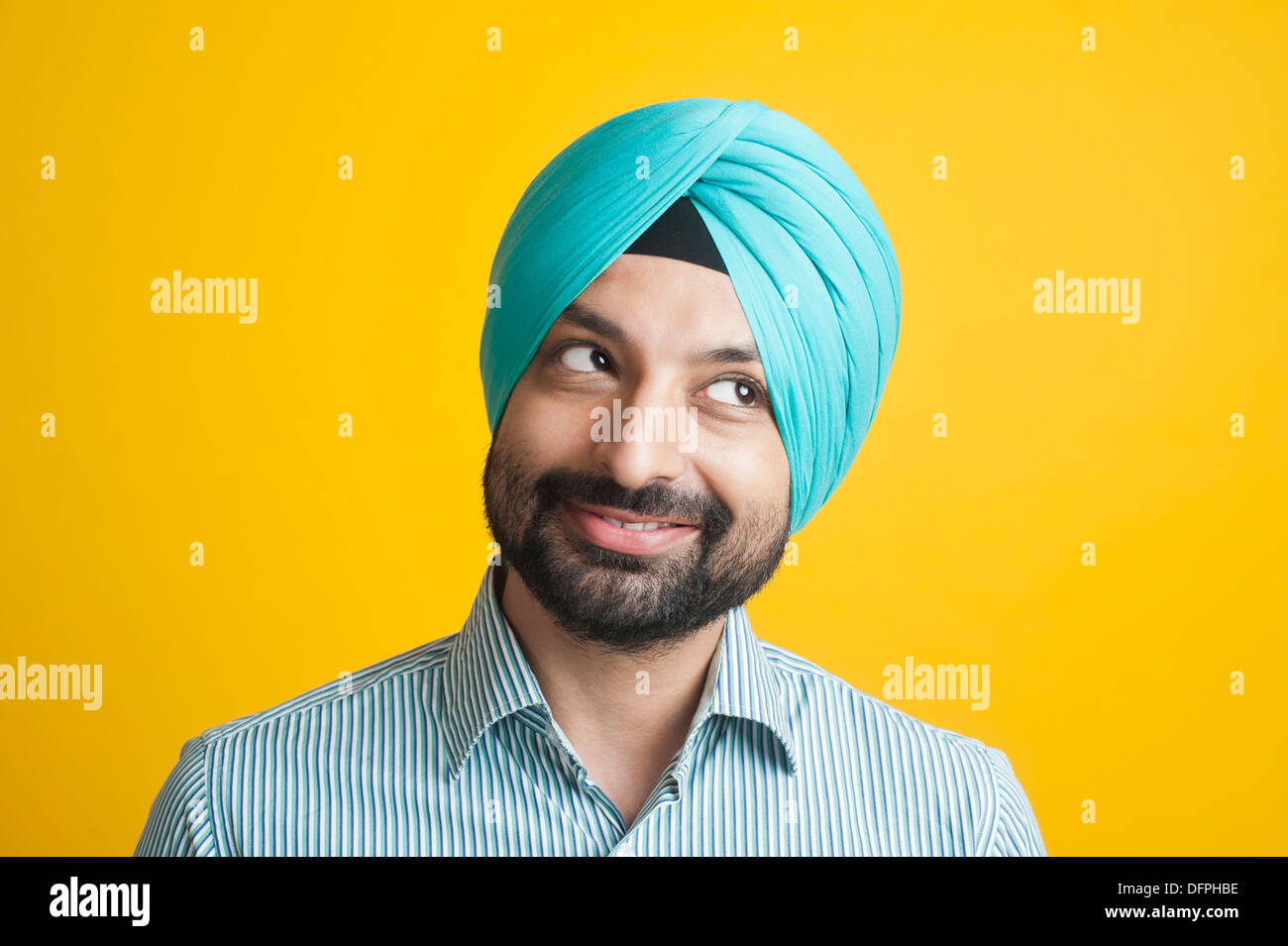 Close-up of a Sikh man smiling Stock Photo - Alamy