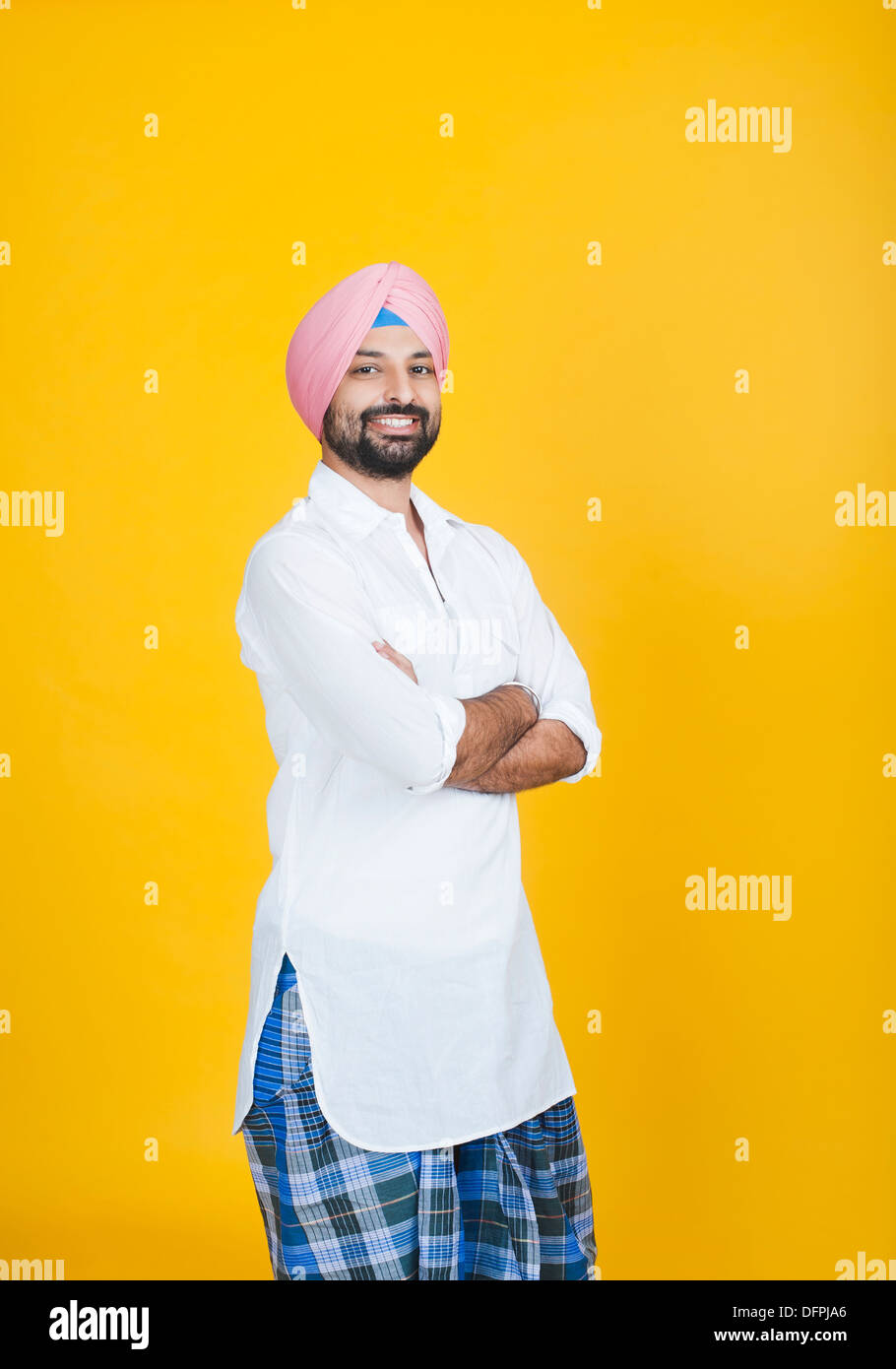Portrait sikh man standing arms hi-res stock photography and images - Alamy