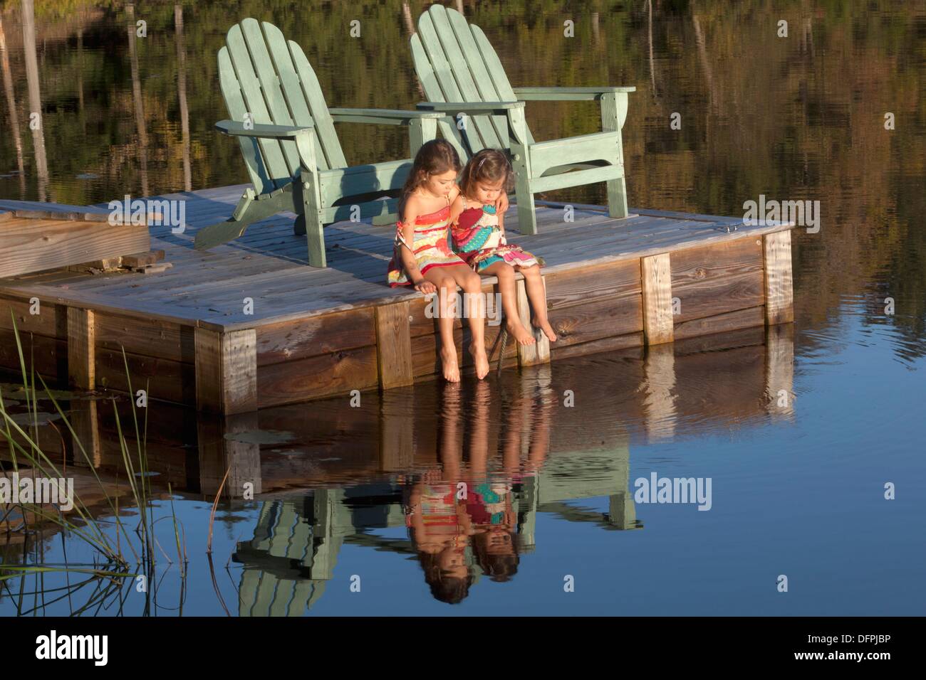 Girl Sitting On Dock Feet High Resolution Stock Photography and Images ...