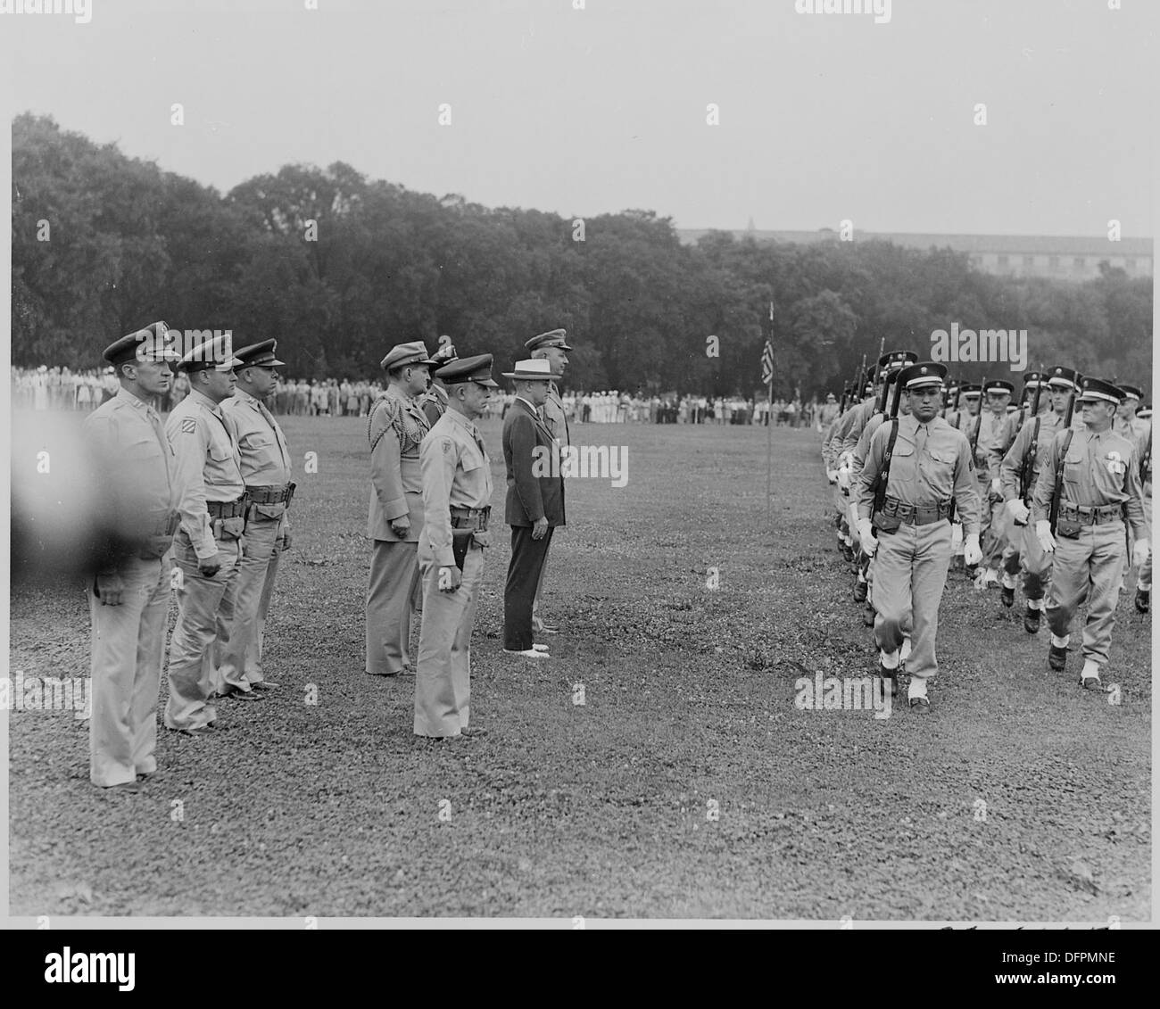A photograph of President Harry S. Truman reviewing the military police ...