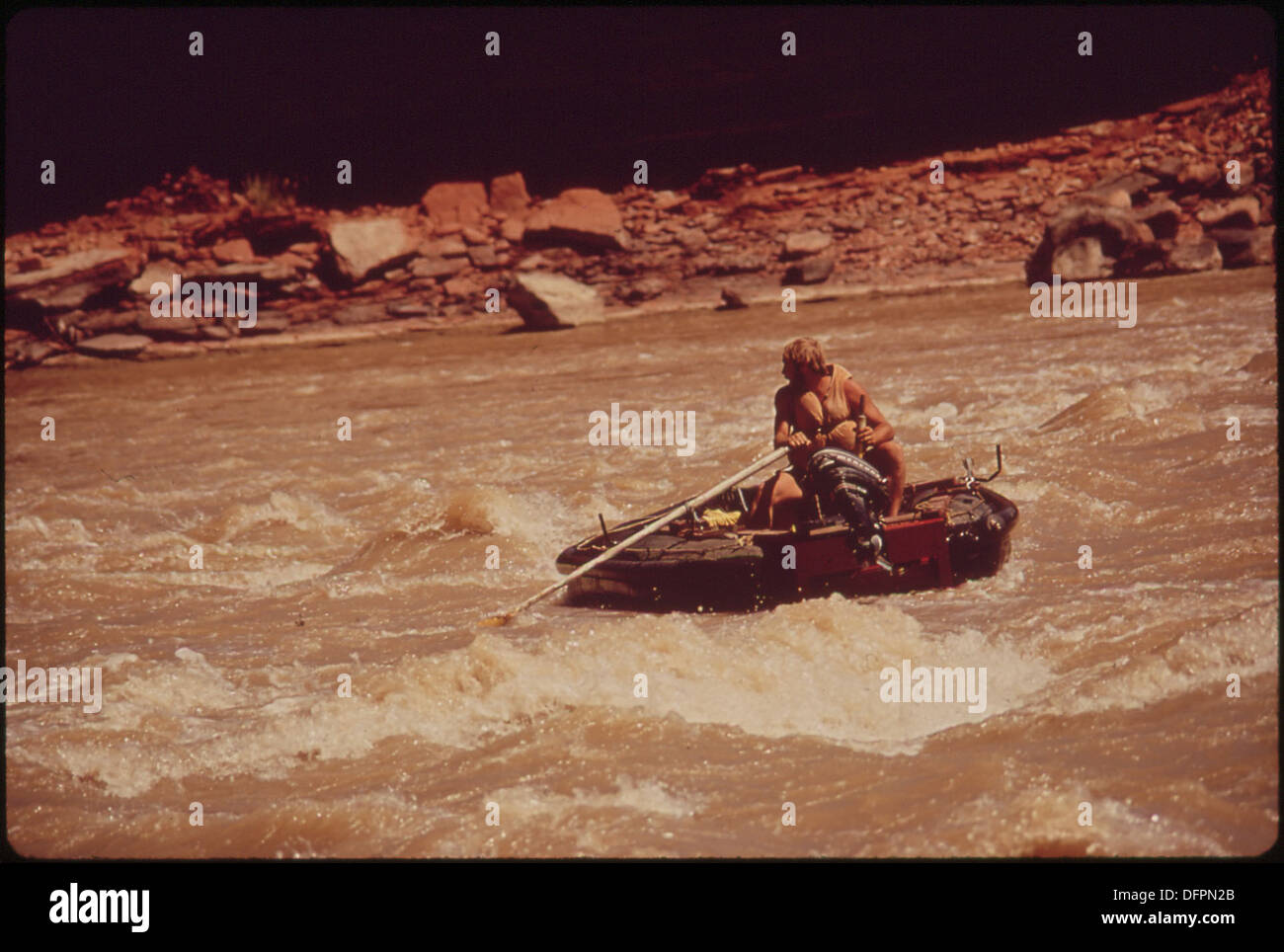 Adventurers shoot the rapids on the Colorado River south of Moab ...