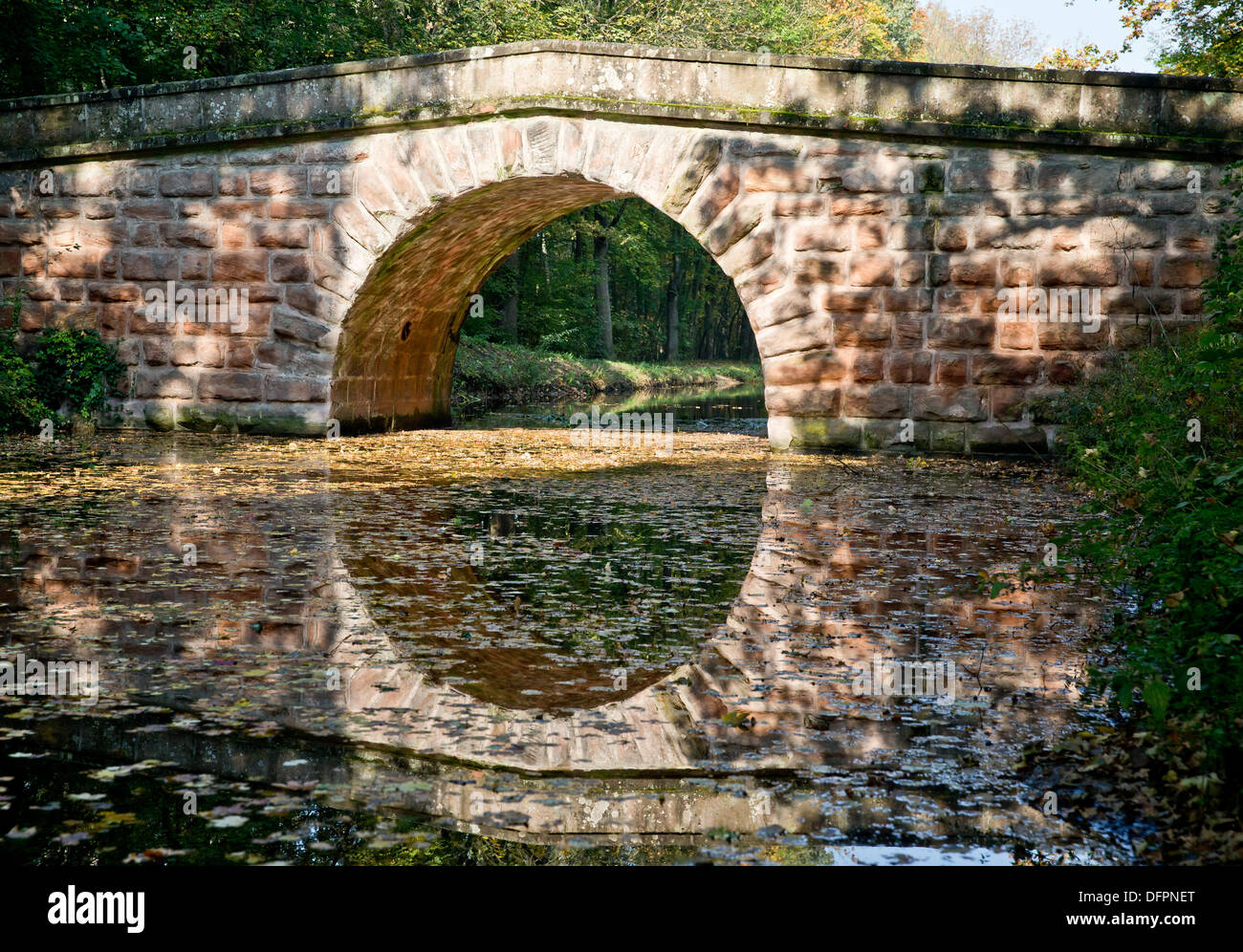 Nuremberg, Germany. 08th Oct, 2013. An arched stone bridge is reflected ...