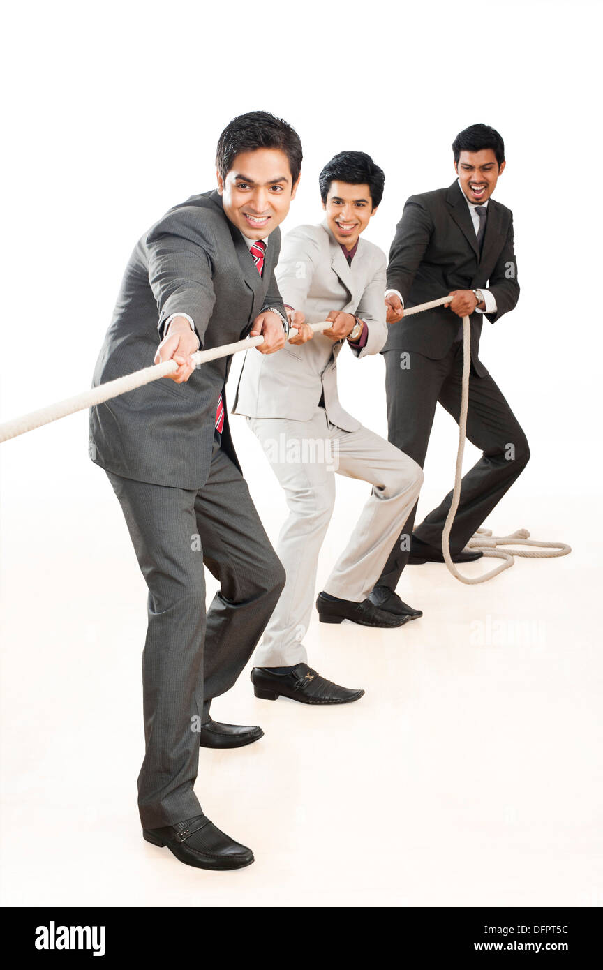 Playing tug of war hi-res stock photography and images - Alamy