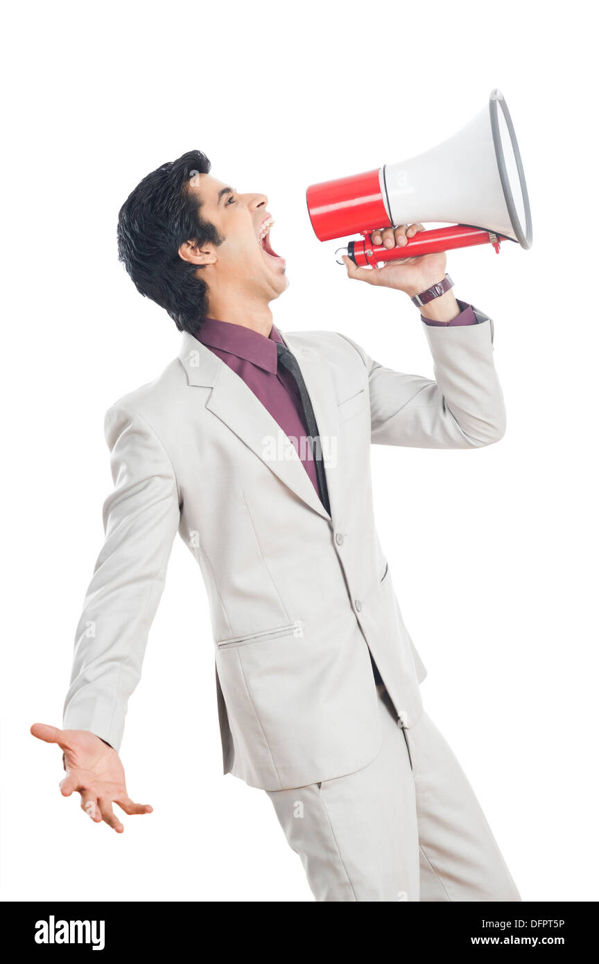 Asian businessman megaphone shouting hi-res stock photography and ...