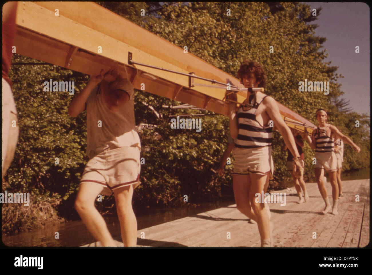 This image shows a visiting crew at Groton School near the Nashua River ...
