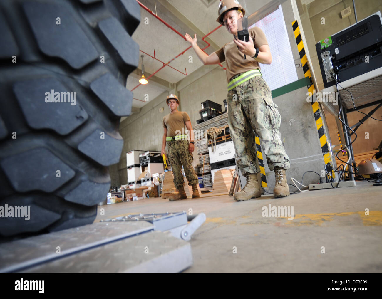 Equipment Operator 2nd Class Jennifer Harris, assigned to Naval Mobile ...