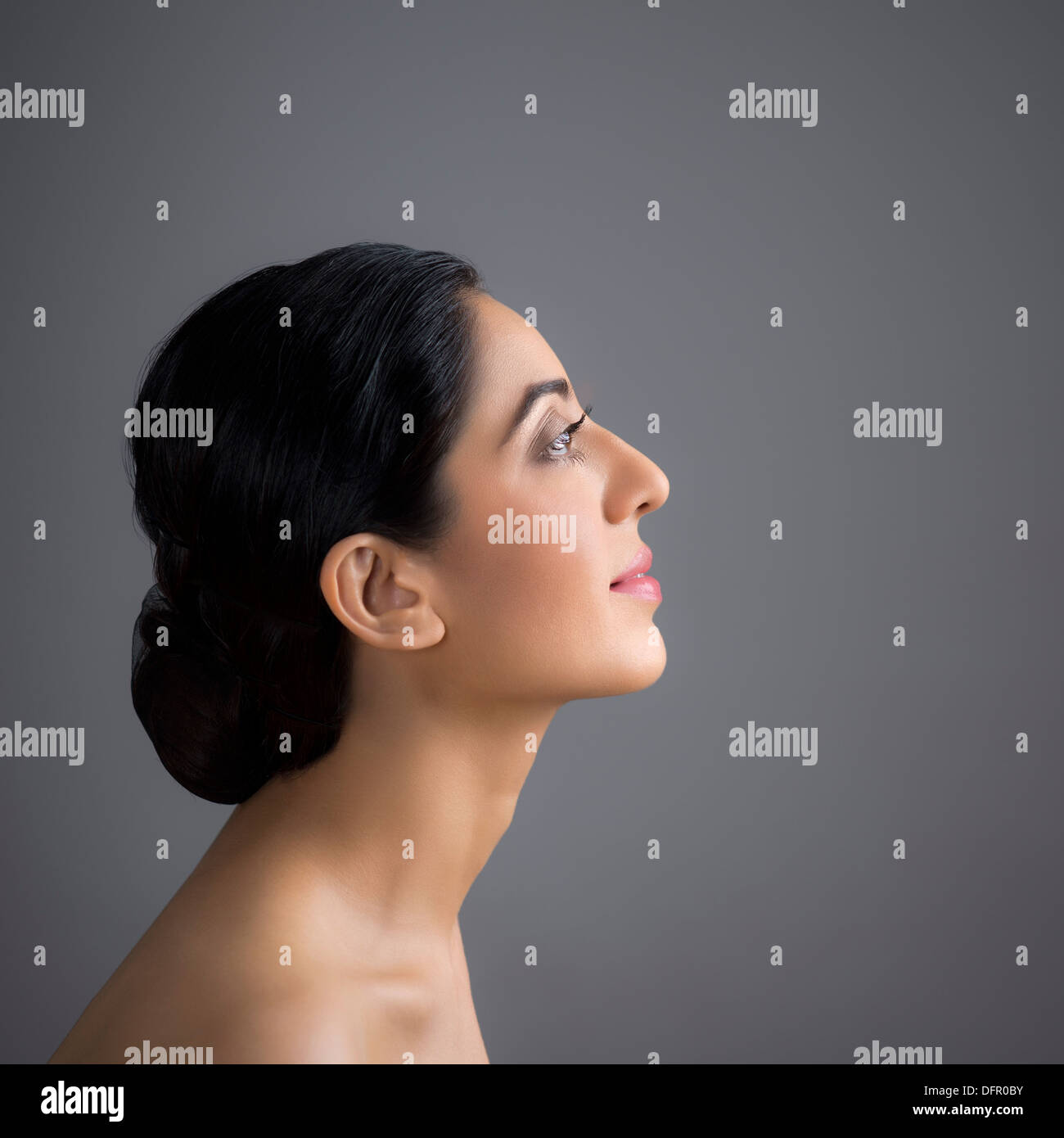Beautiful woman looking up hi-res stock photography and images - Alamy