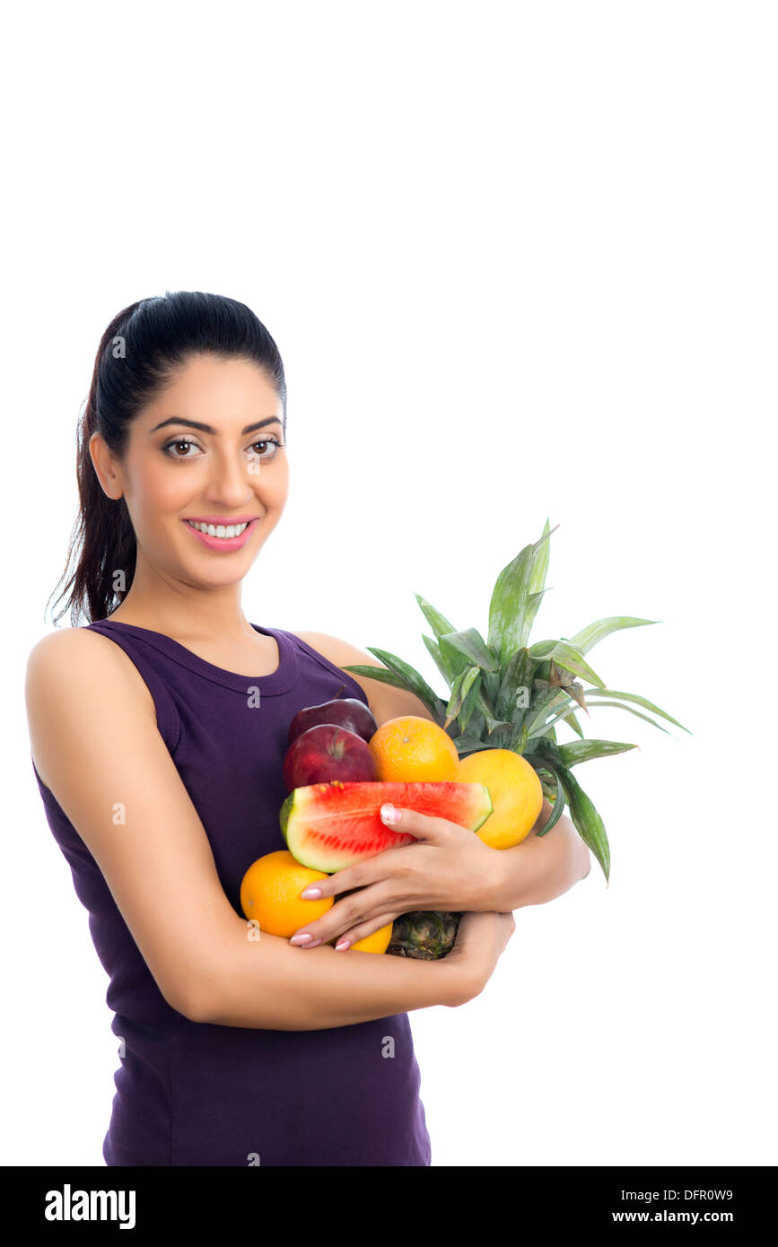 Woman carrying fruit hi-res stock photography and images - Alamy