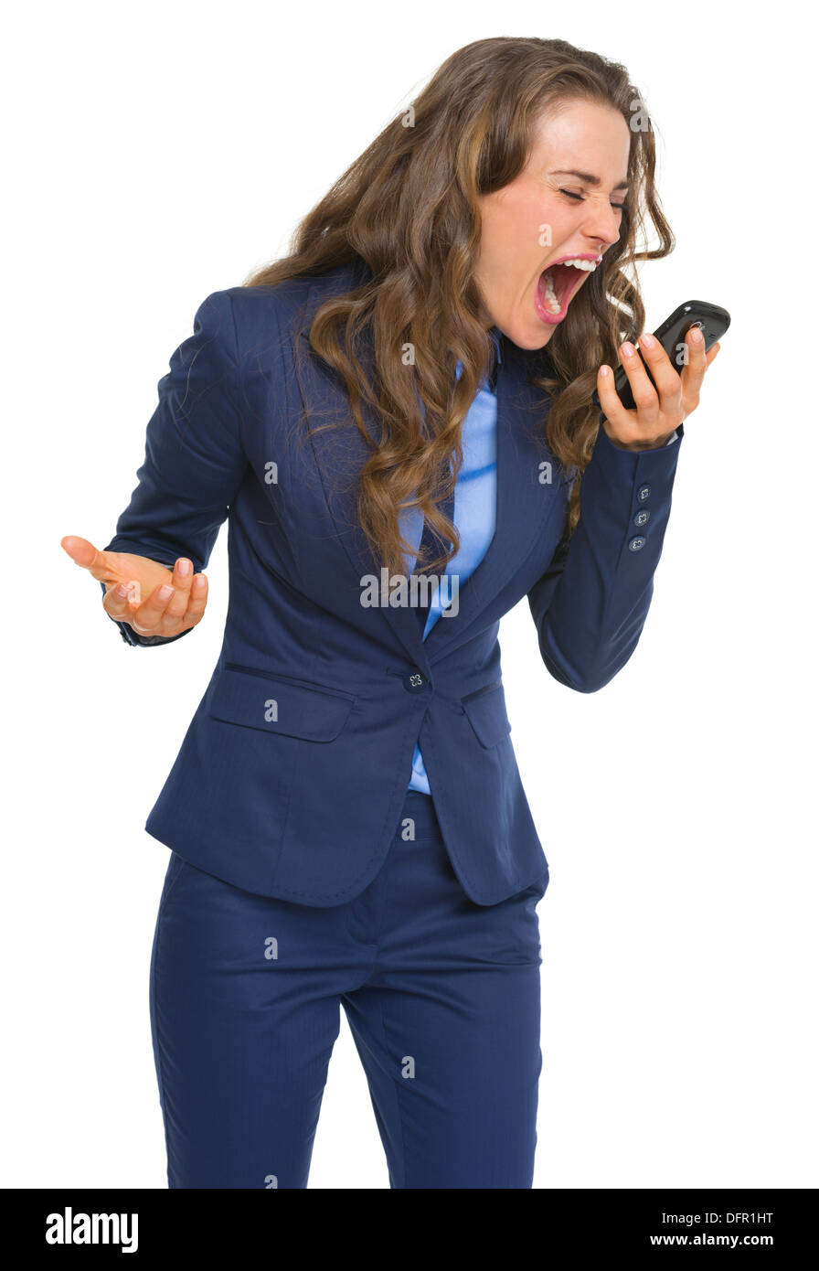 Angry business woman shouting in cell phone Stock Photo - Alamy