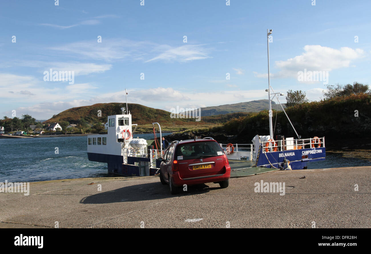 Car driving onto Luing ferry in South Cuan Isle of Luing Scotland ...