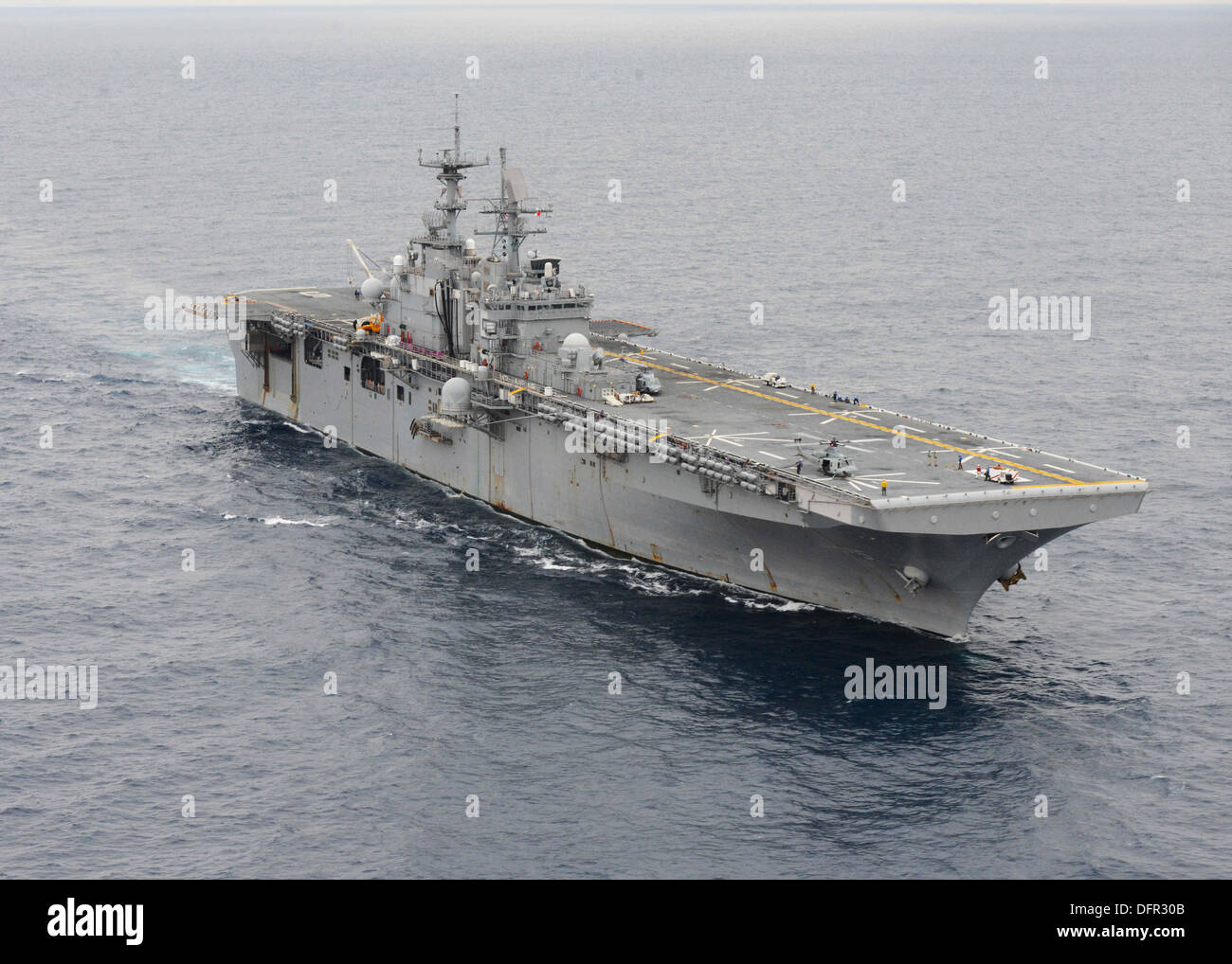 USS Bataan (LHD5) is underway with the 22nd Marine Expeditionary Unit ...