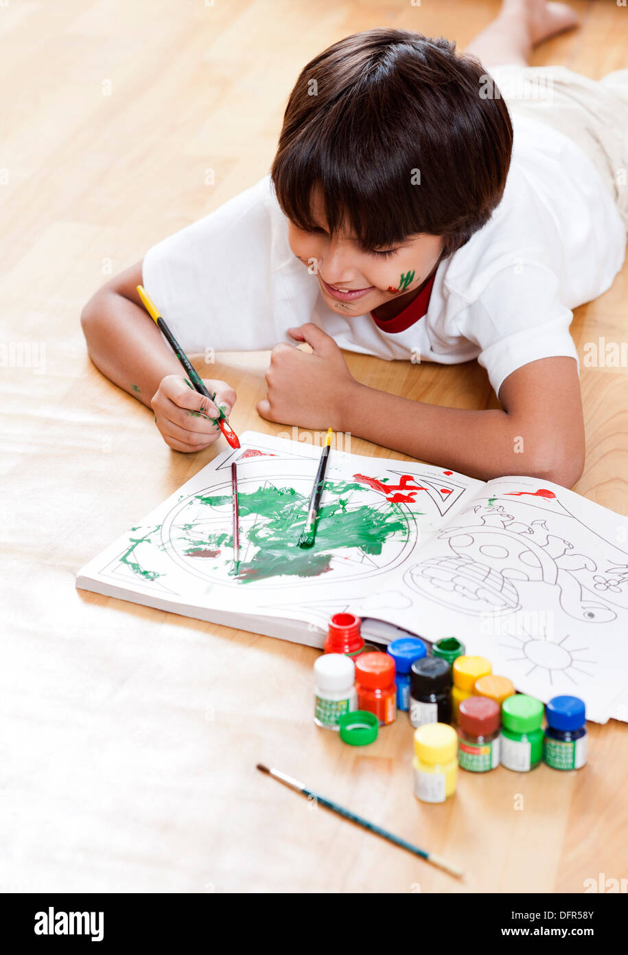 Boy making a painting Stock Photo - Alamy