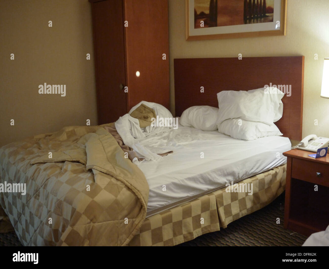 messy hotel bed Stock Photo - Alamy