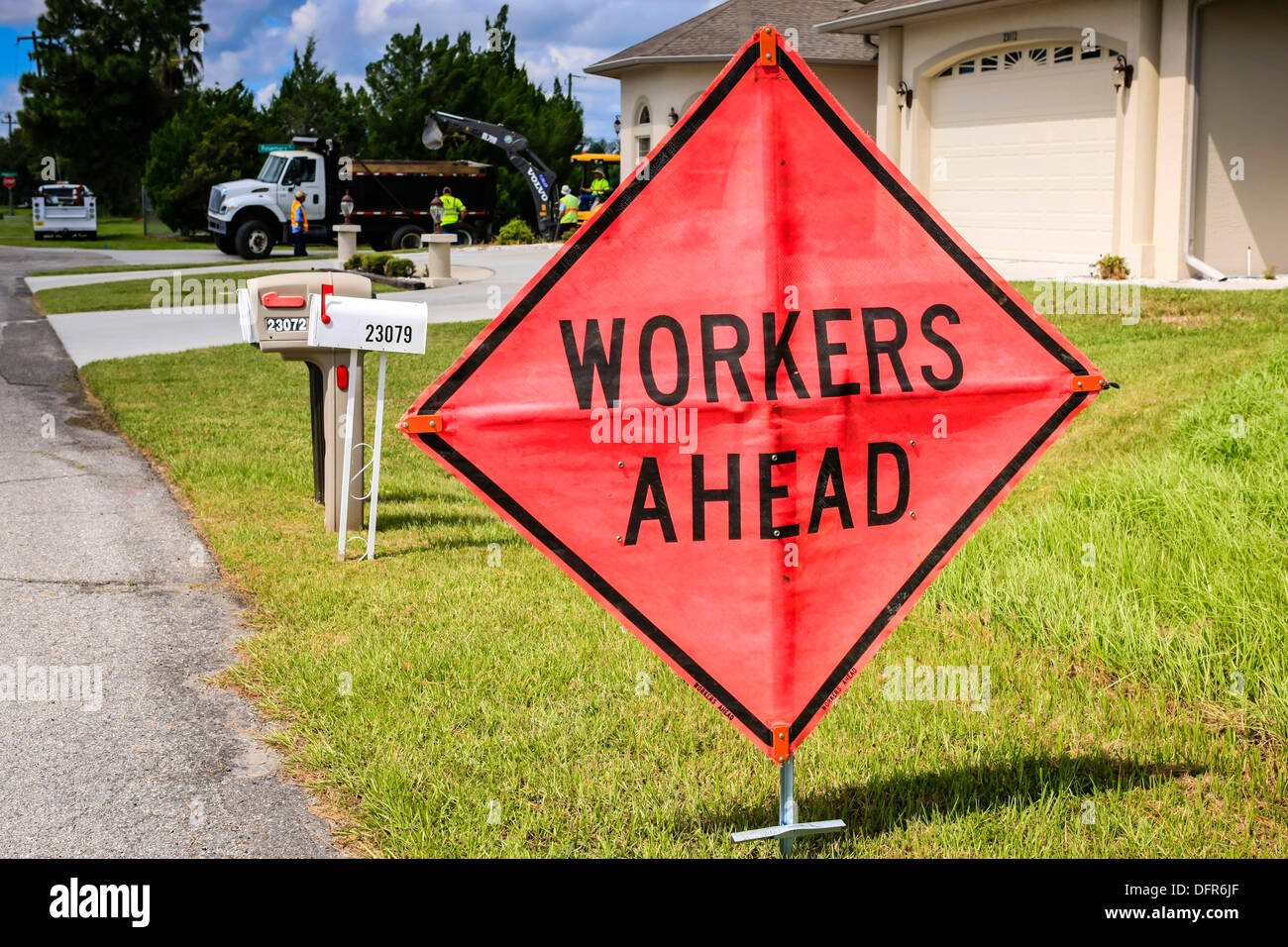 Orange diamond shaped sign hi-res stock photography and images - Alamy