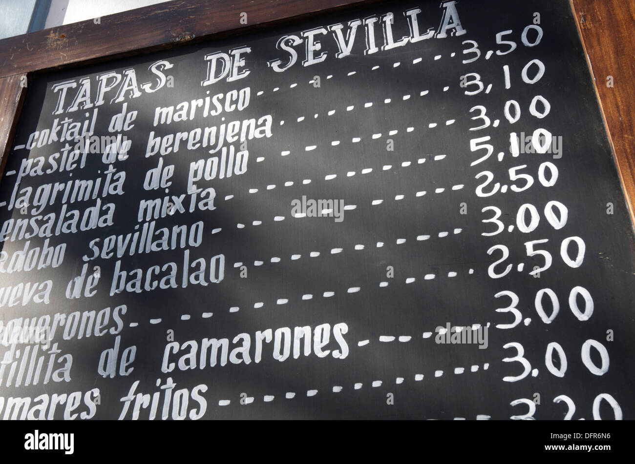foreground of a poster of the menu in a typical Spanish restaurant ...
