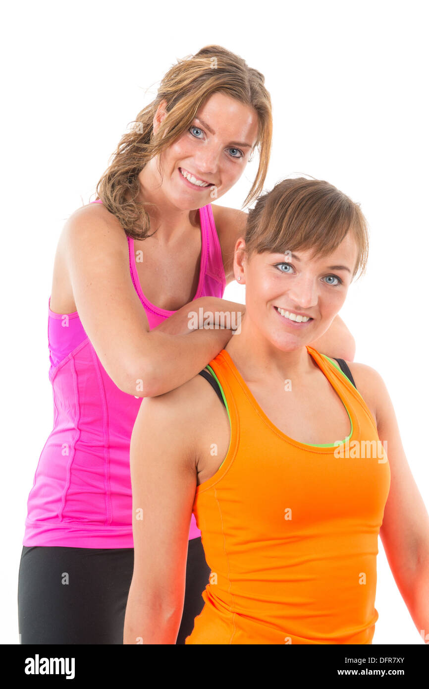 Two sport girls isolated over white background Stock Photo - Alamy