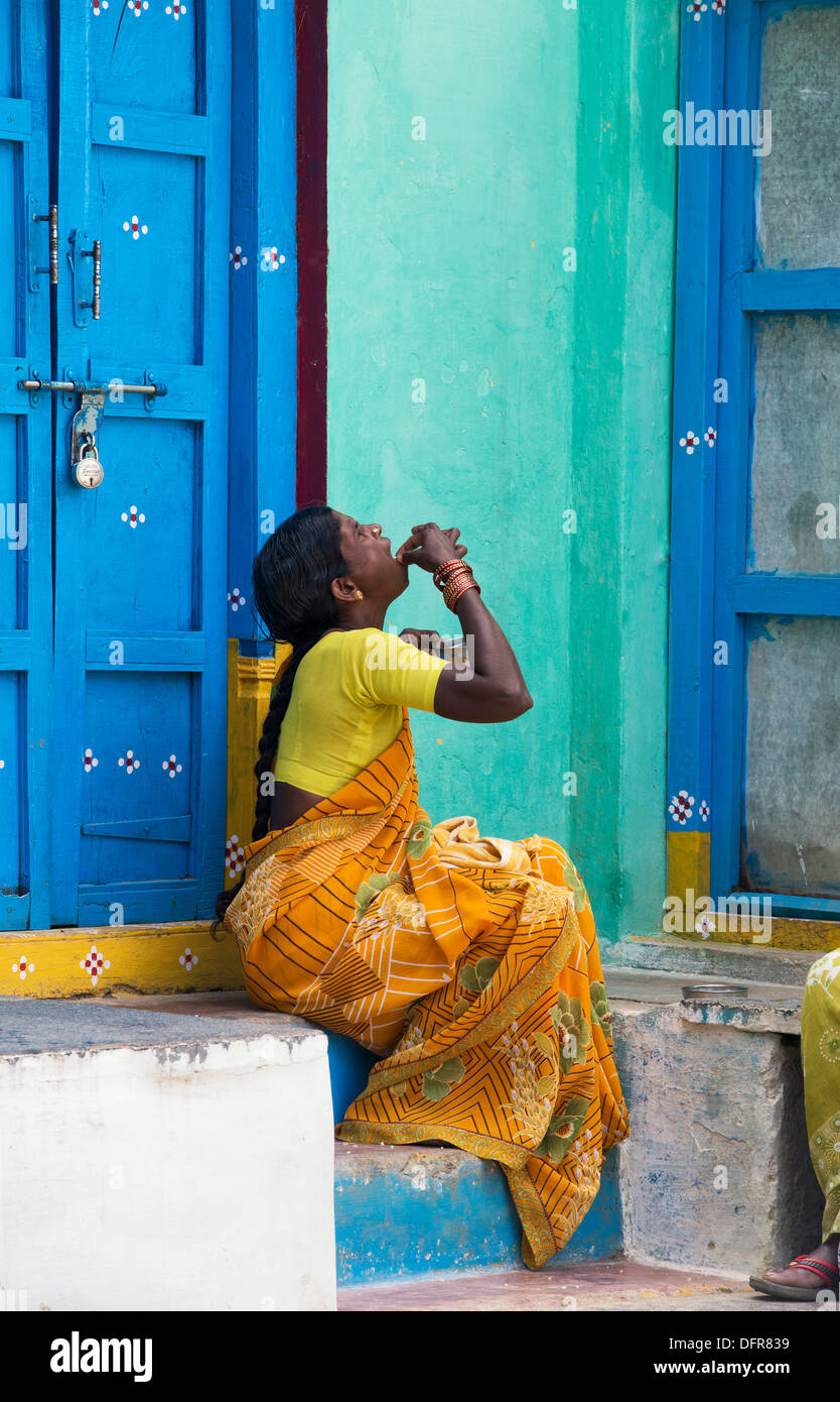Indian diabetic patient taking a tablet at Sri Sathya Sai Baba mobile ...