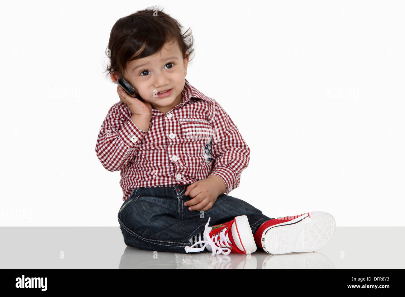 Four Year Old Indian Boy Talking On A Cell Phone Stock Photo Alamy four-year-old-indian-boy-talking-on-a-cell-phone-stock-photo-alamy