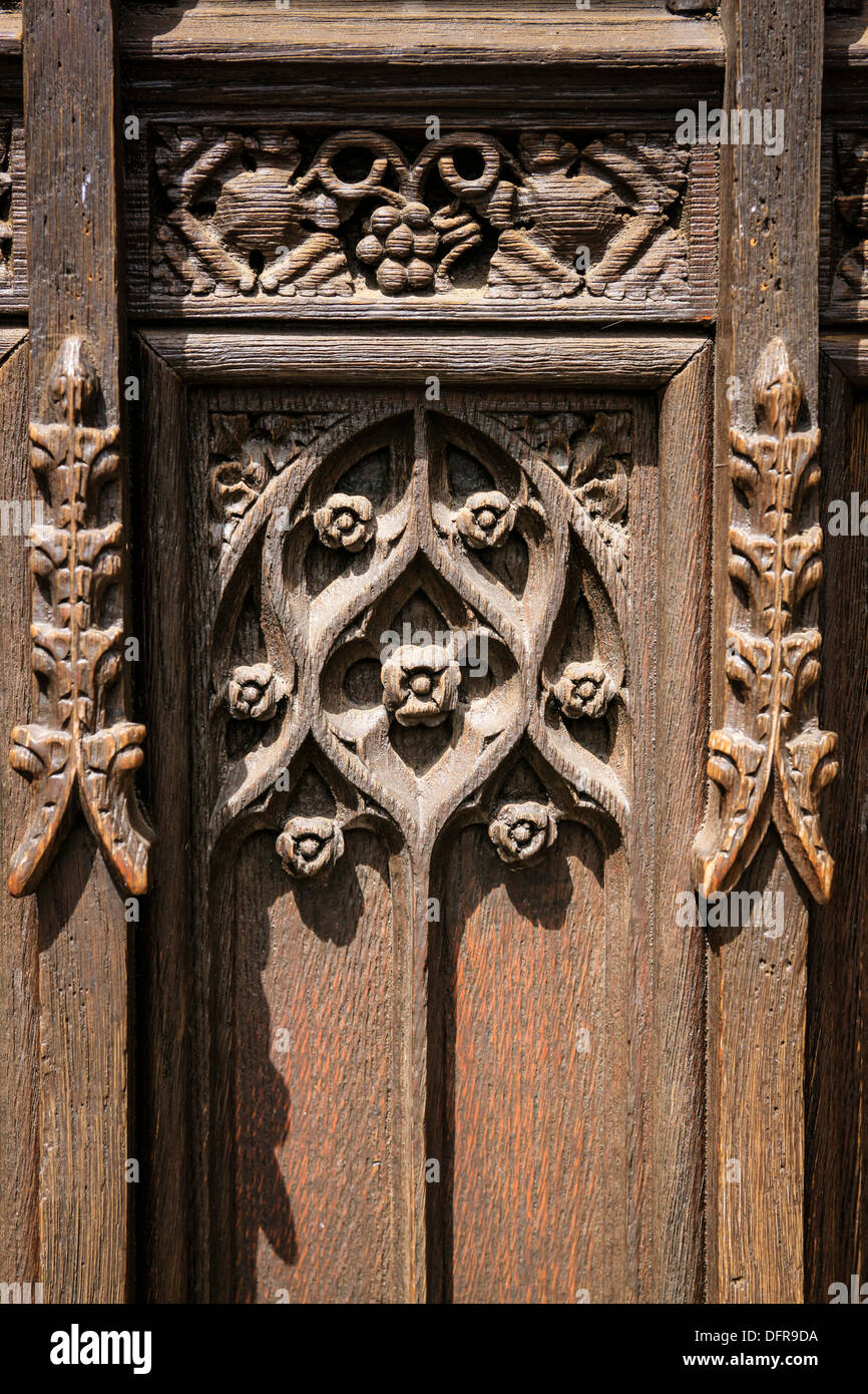 Hand carved wooden panel in a door from the English medieval period ...