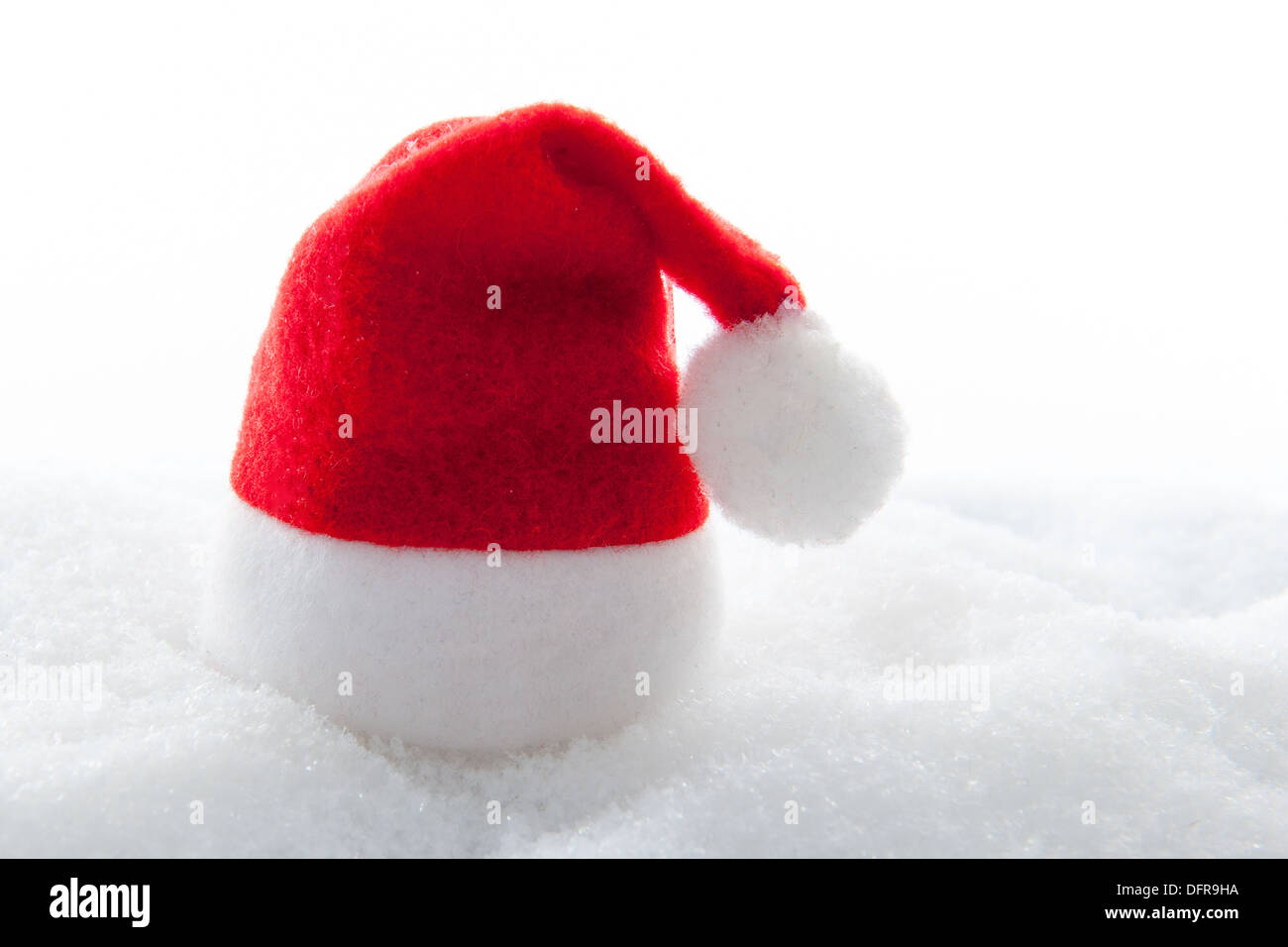 Santa lost his Christmas hat in the snow Stock Photo - Alamy