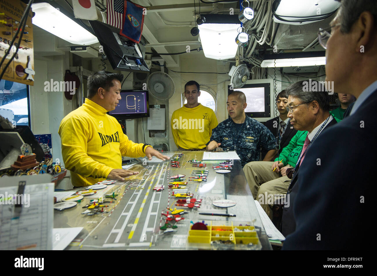 Lt. Cmdr. Ivan Borja, flight deck handler of the U.S. Navy's forward ...