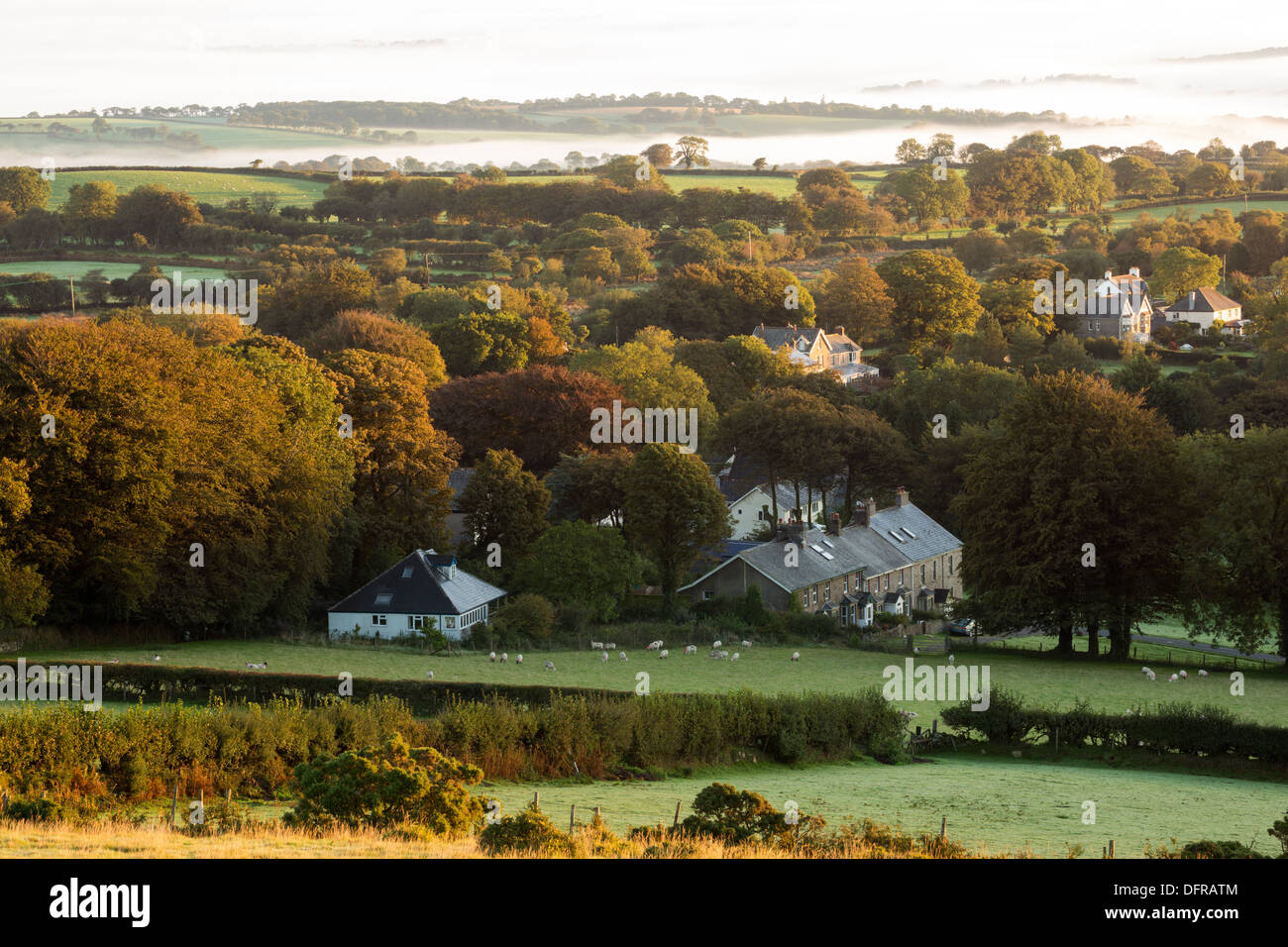 Early morning autumn sunrise over Belstone village Dartmoor National ...