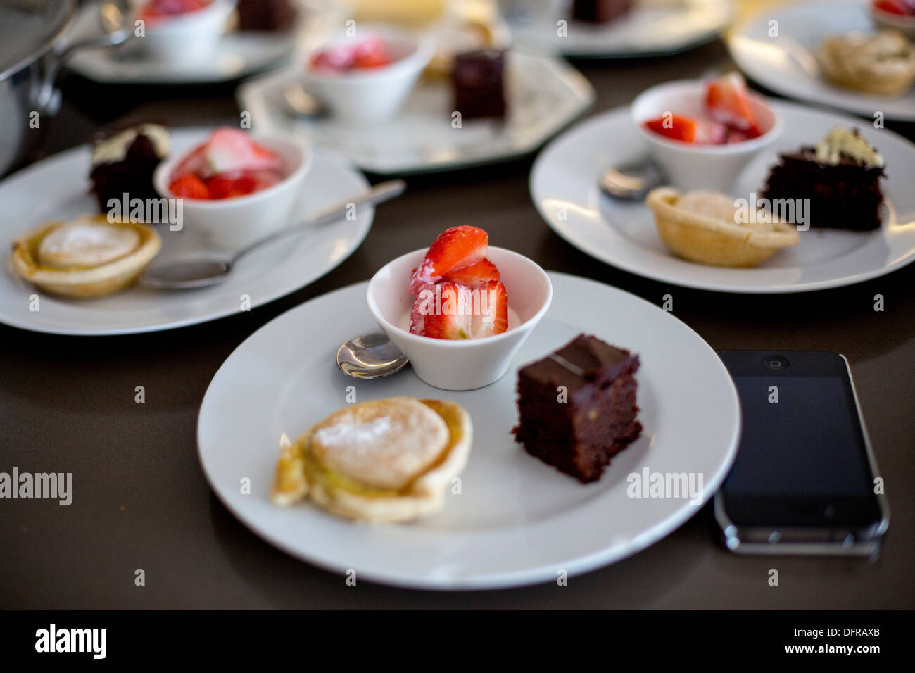 trio of deserts strawberries apple pie chocolate cake Stock Photo - Alamy
