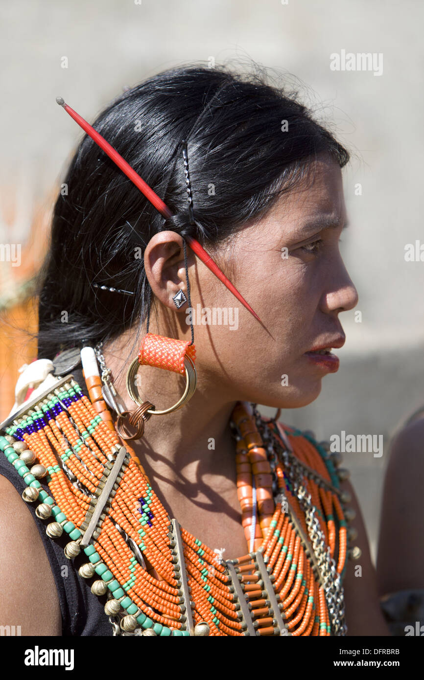 Tribal woman wearing colorful jewelery at Hornbill festival, Nagaland ...