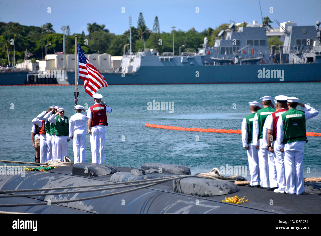Sailors aboard the Los Angeles-class attack submarine USS Charlotte ...