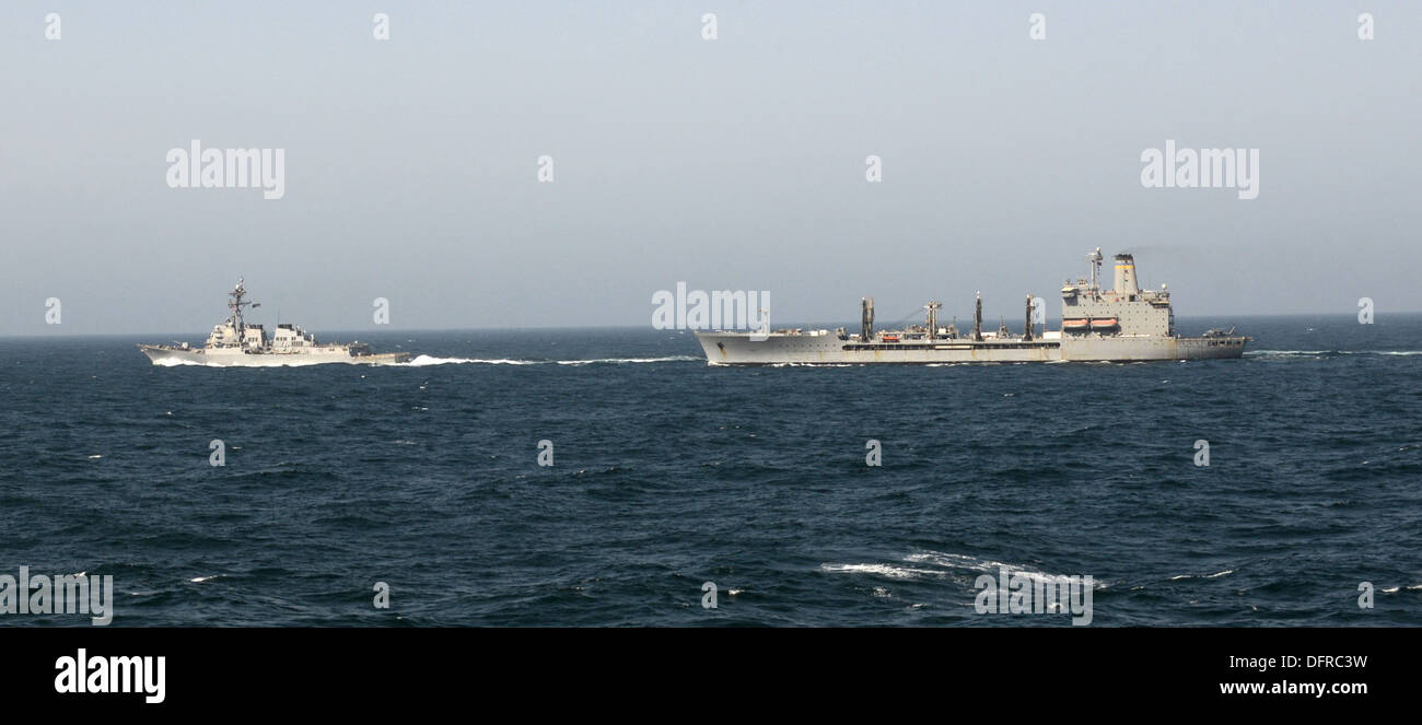 The guided-missile destroyer USS Bulkeley (DDG 84) transits away from ...