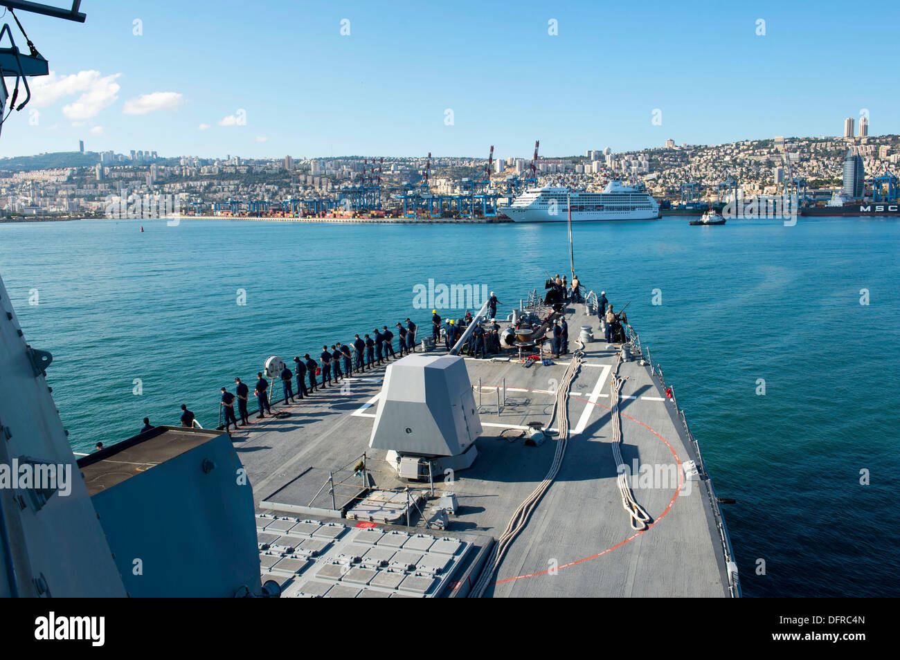 The guided-missile destroyer USS Gravely (DDG 107) prepares to pull ...