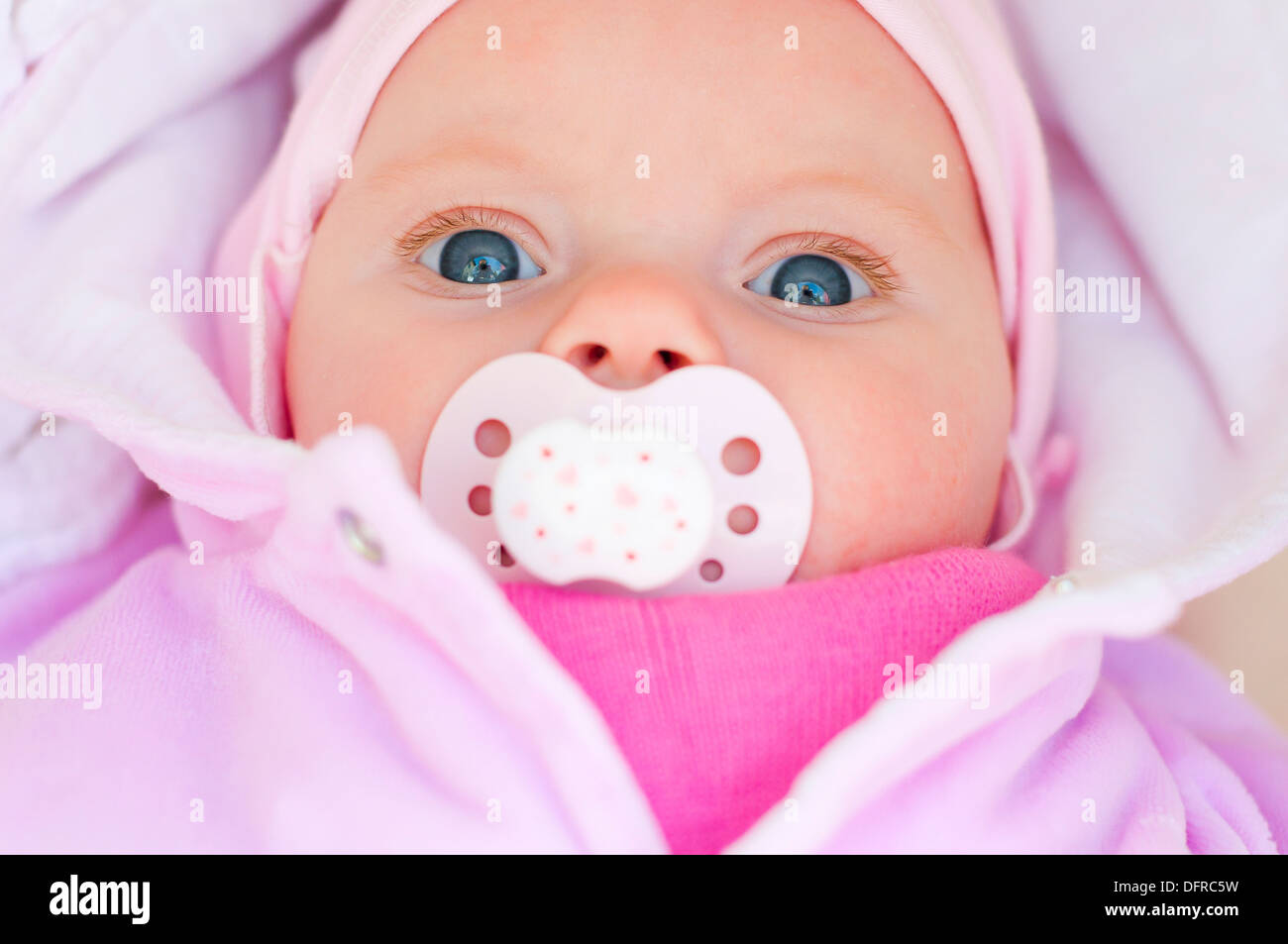 portrait of little girl, child dressed in pink Stock Photo - Alamy
