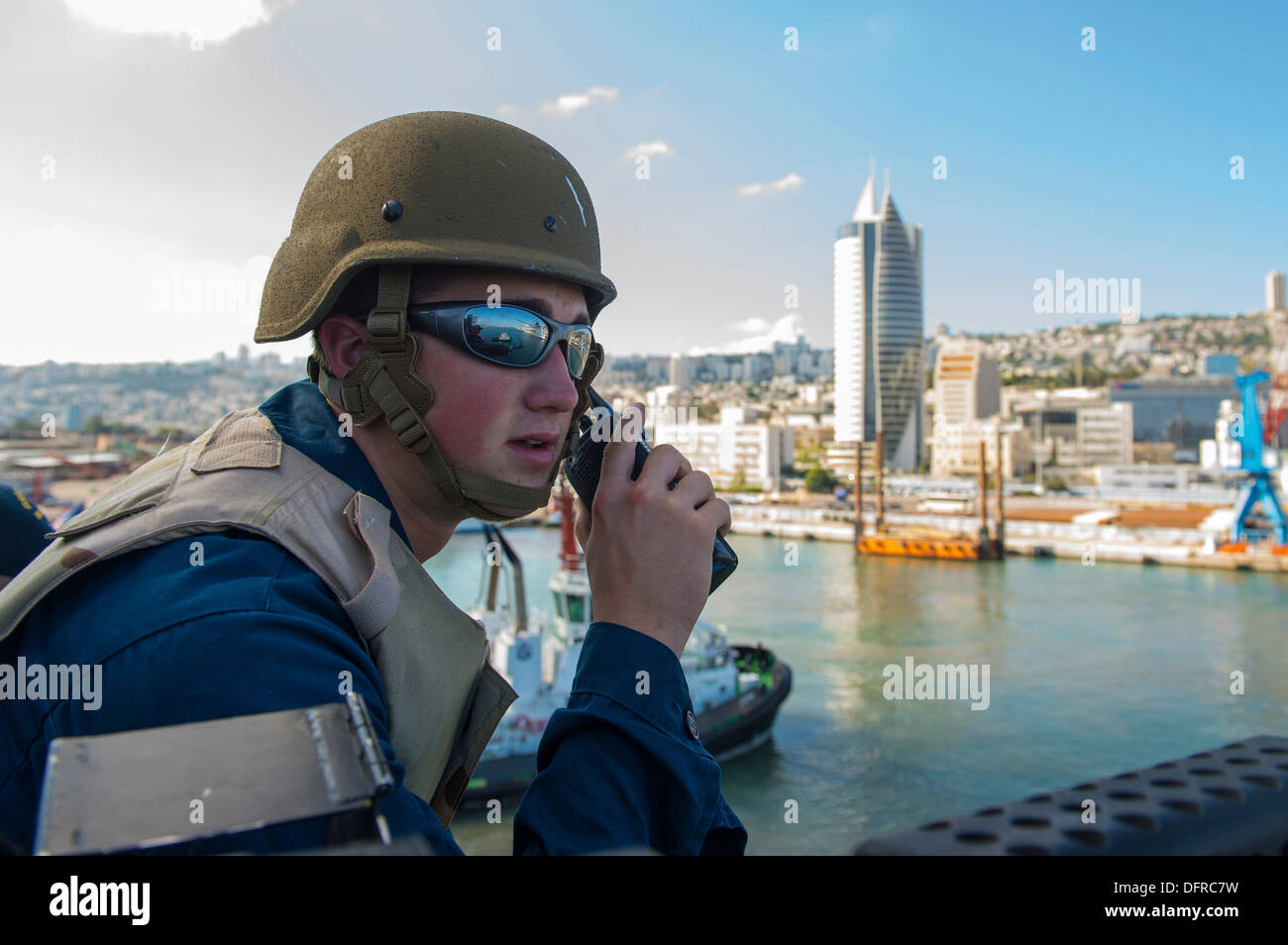 Gunner's Mate 3rd Class James Ross calls in a surface contact during ...