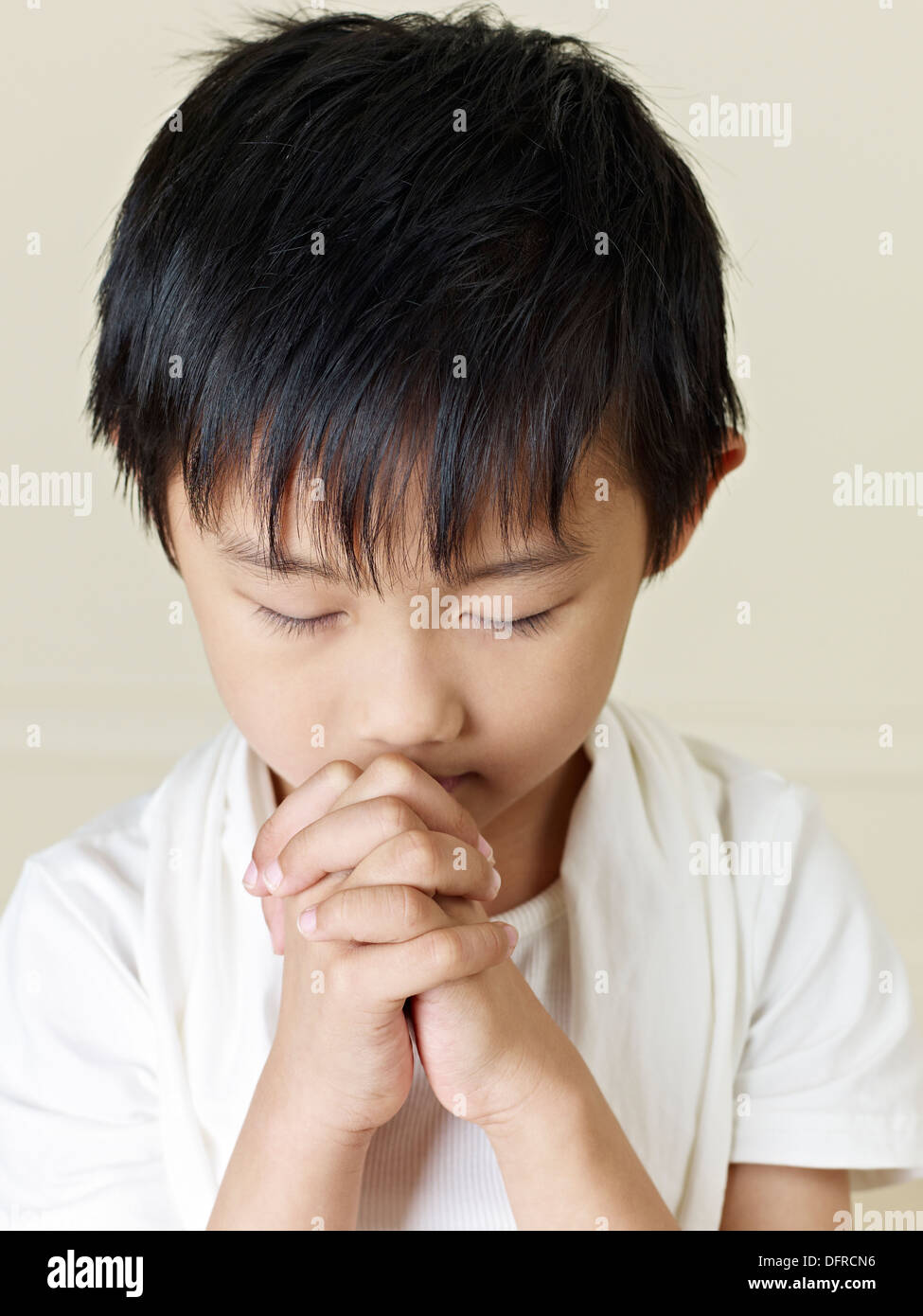 Boy praying asian hi-res stock photography and images - Alamy