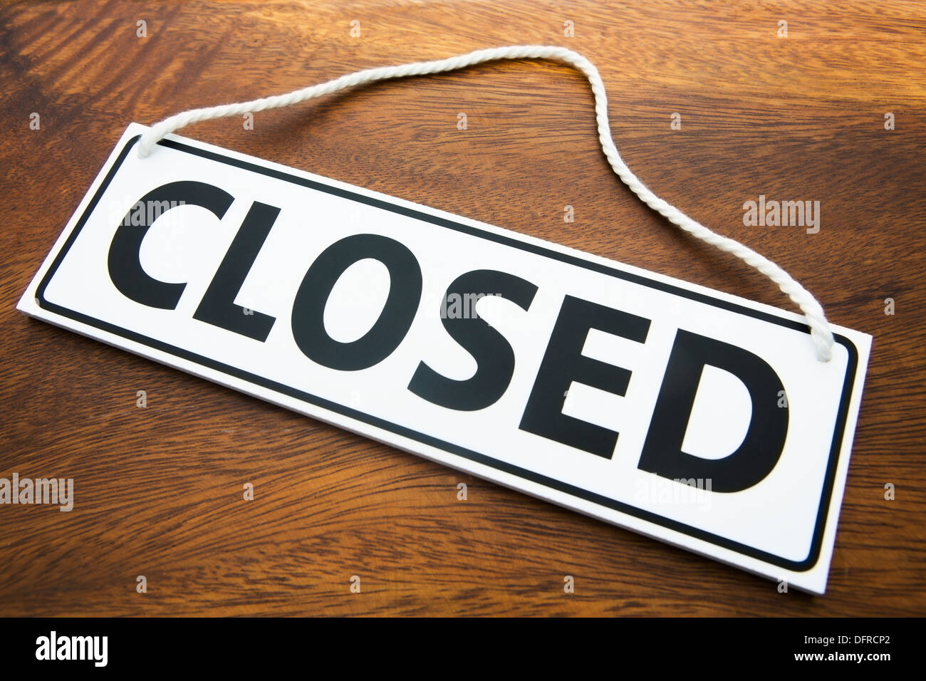 Shop Closed Sign On Wooden Surface Stock Photo - Alamy