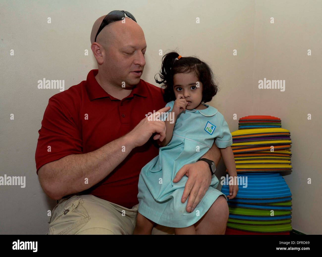 Lt. Cliff Overby, assigned to Commander, Task Force (CTF) 56, interacts ...
