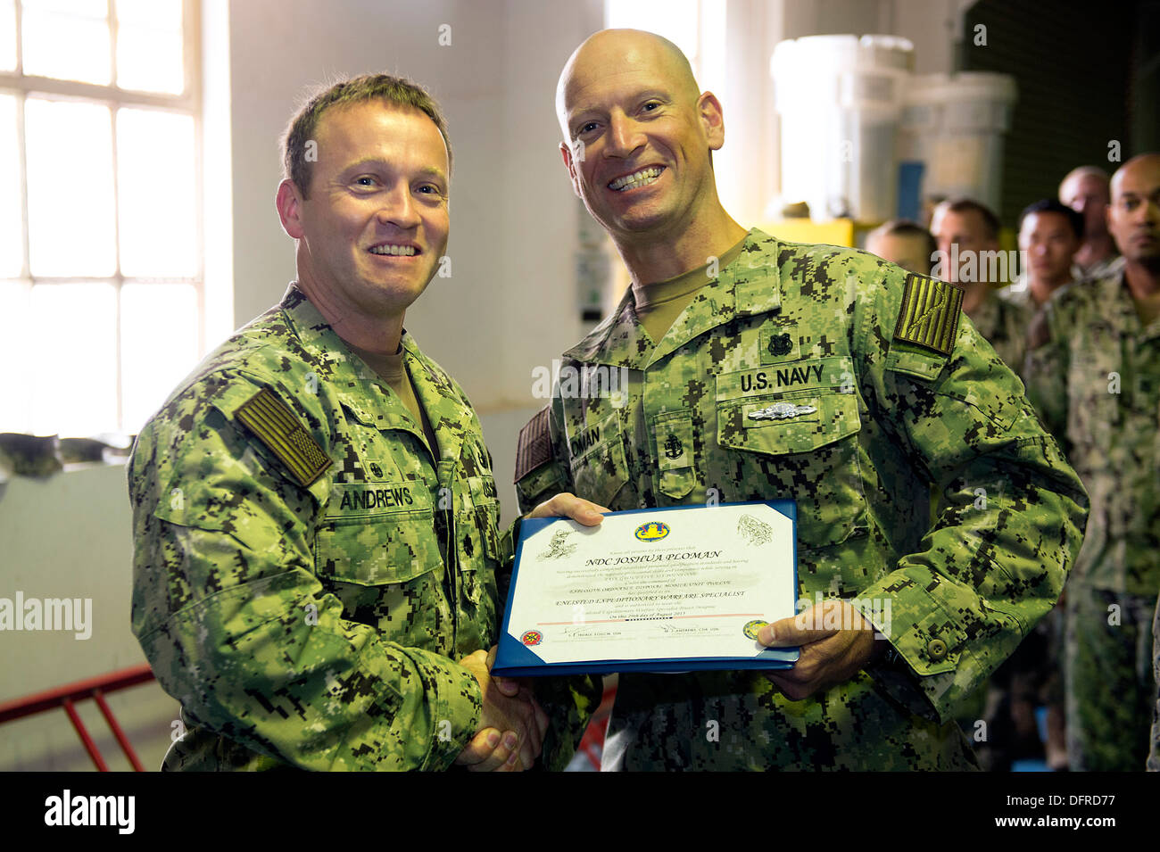 Chief Navy Diver Joshua Ploman, assigned to Commander, Task Group Stock ...