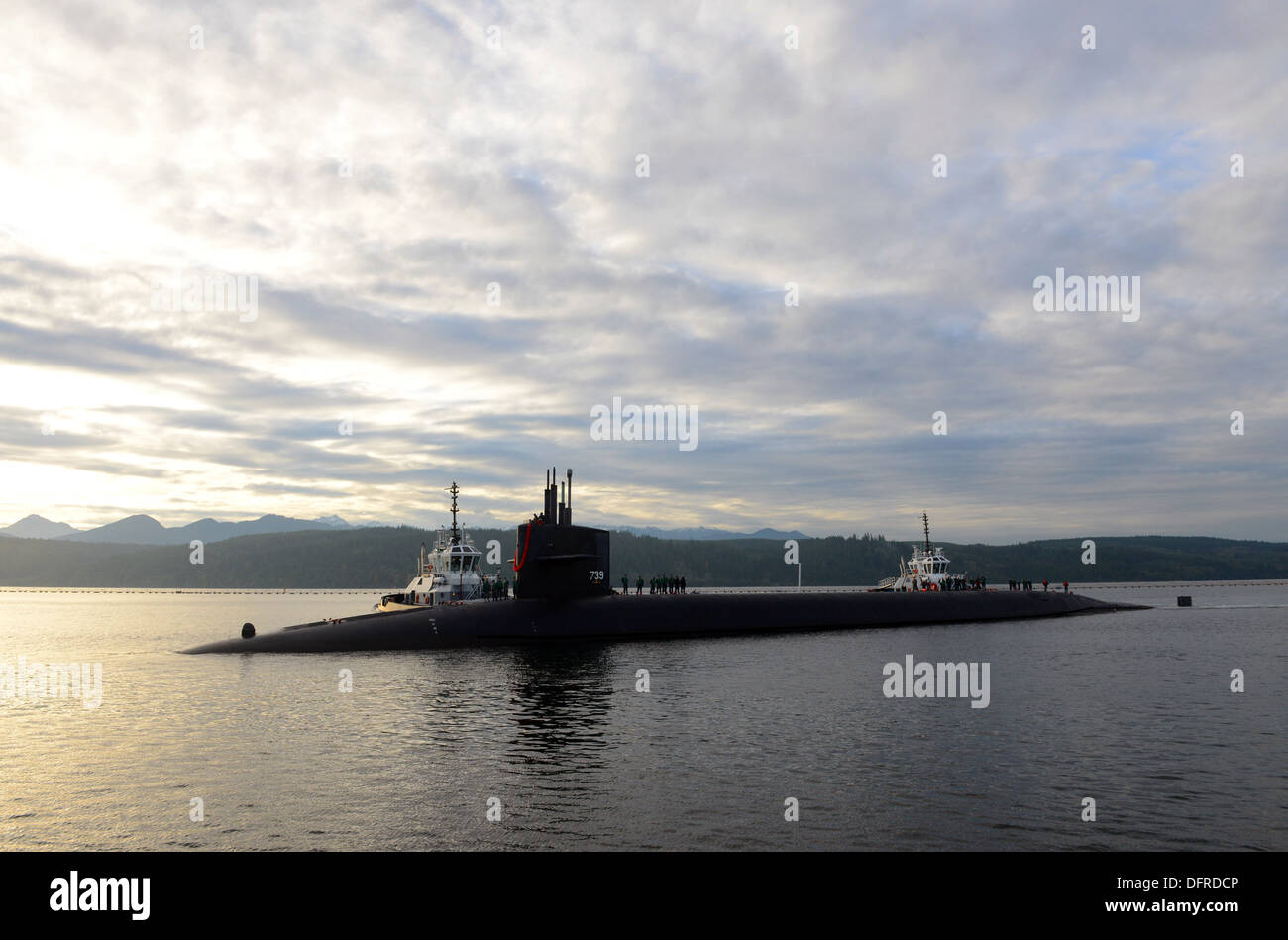 The ballistic-missile submarine USS Nebraska (SSBN 739) moors at its ...